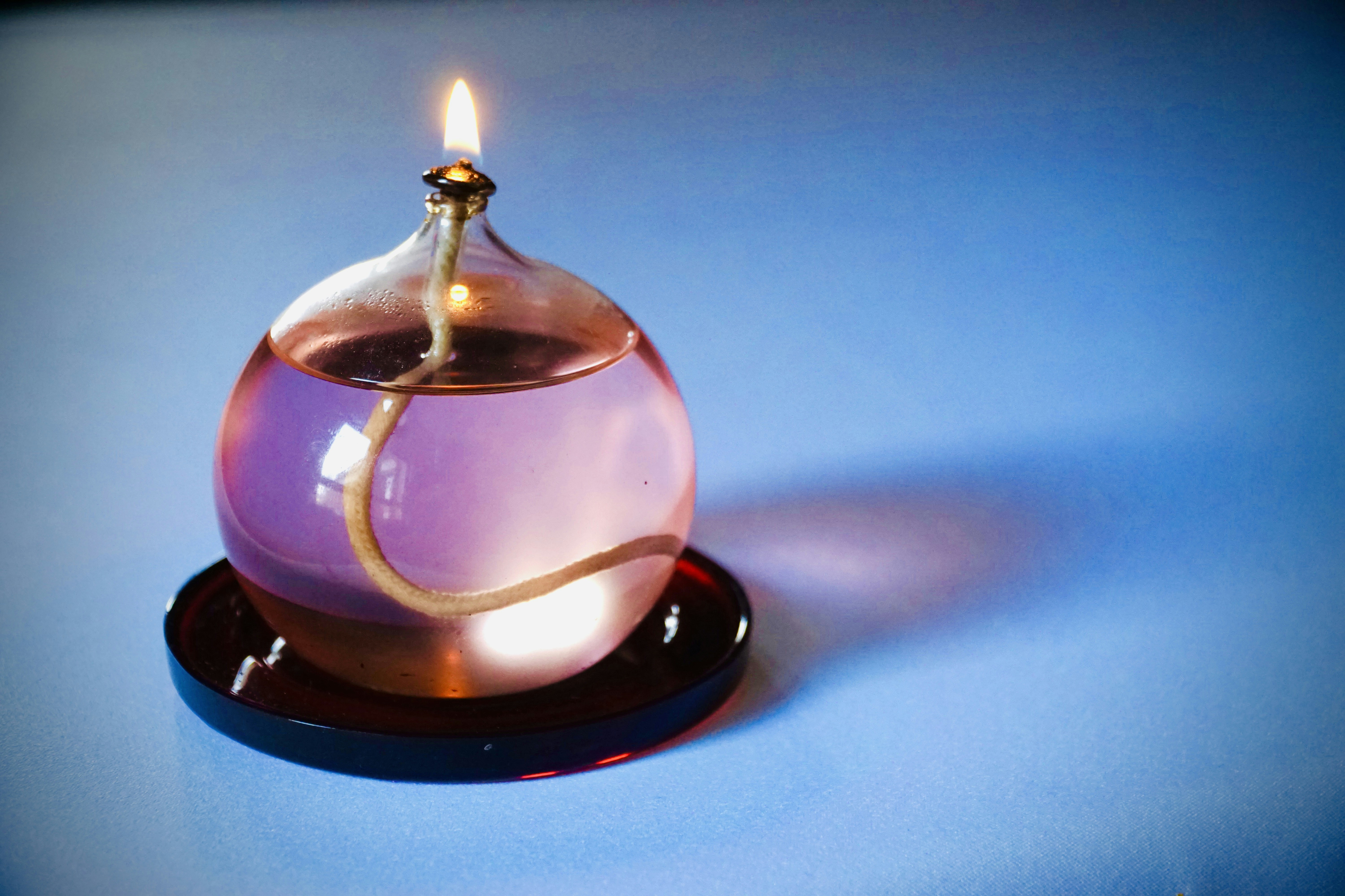 Flame on a Glass Orb: A Quiet Still Life