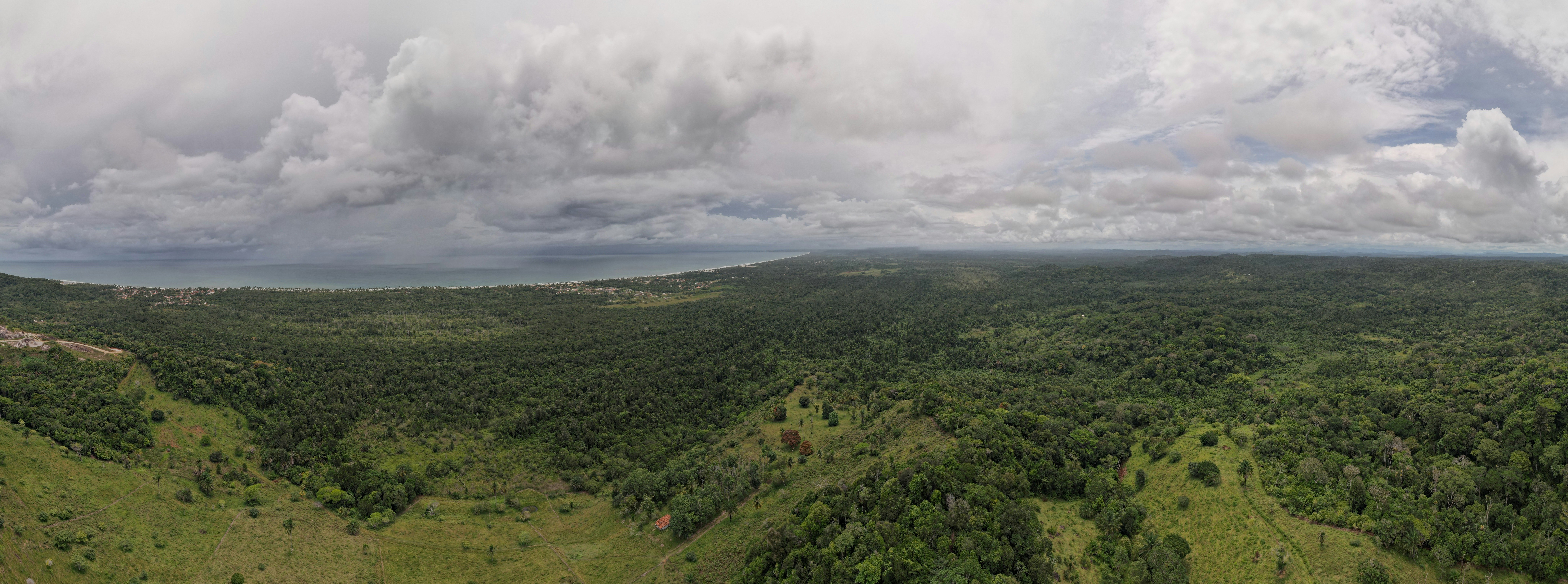 View from Thulia over the farmlands and Mata Atlantica forest  to the coastline north of Ilheus