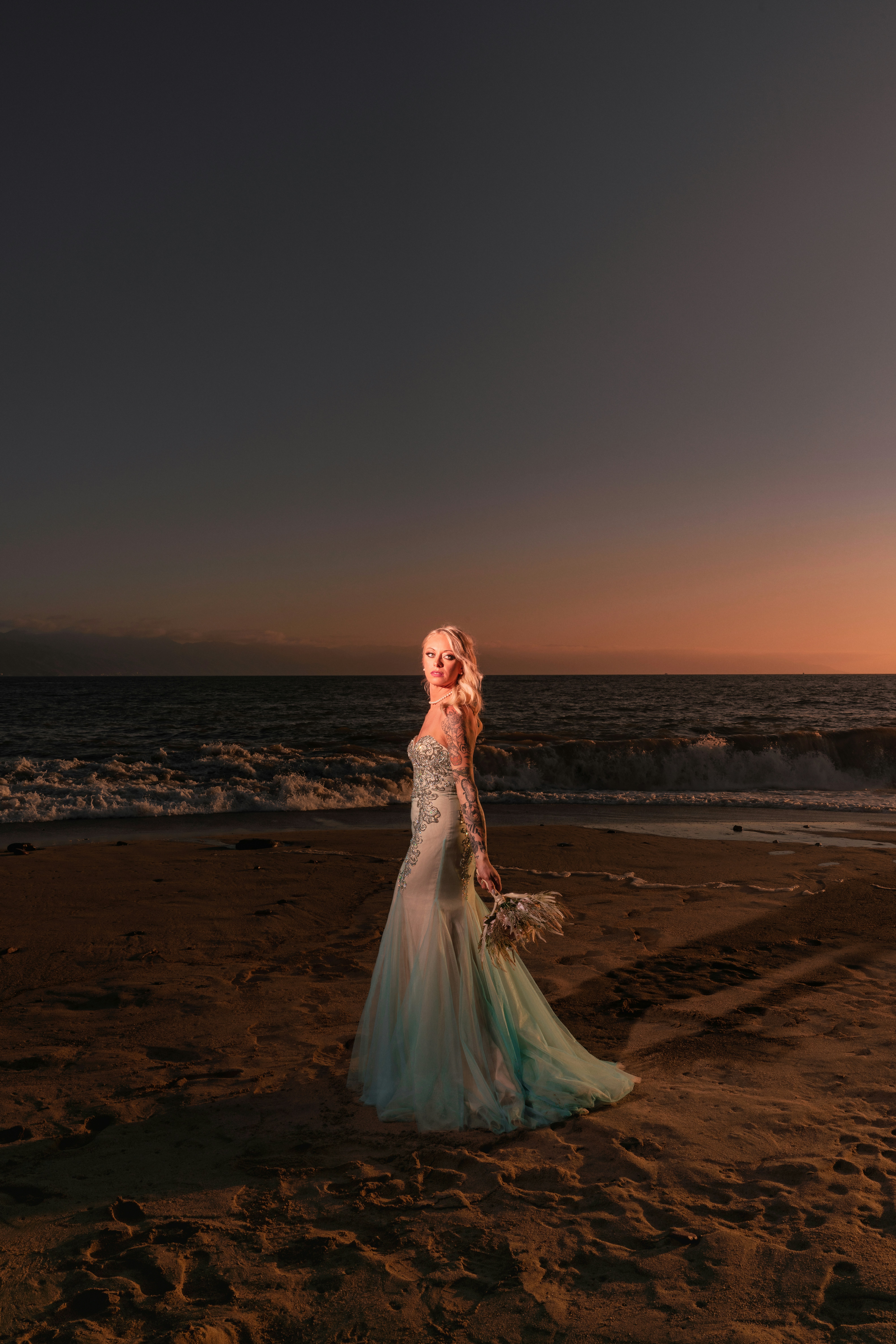 Silk and Salt: A Bride Beneath the Sea-Soft Sunset
