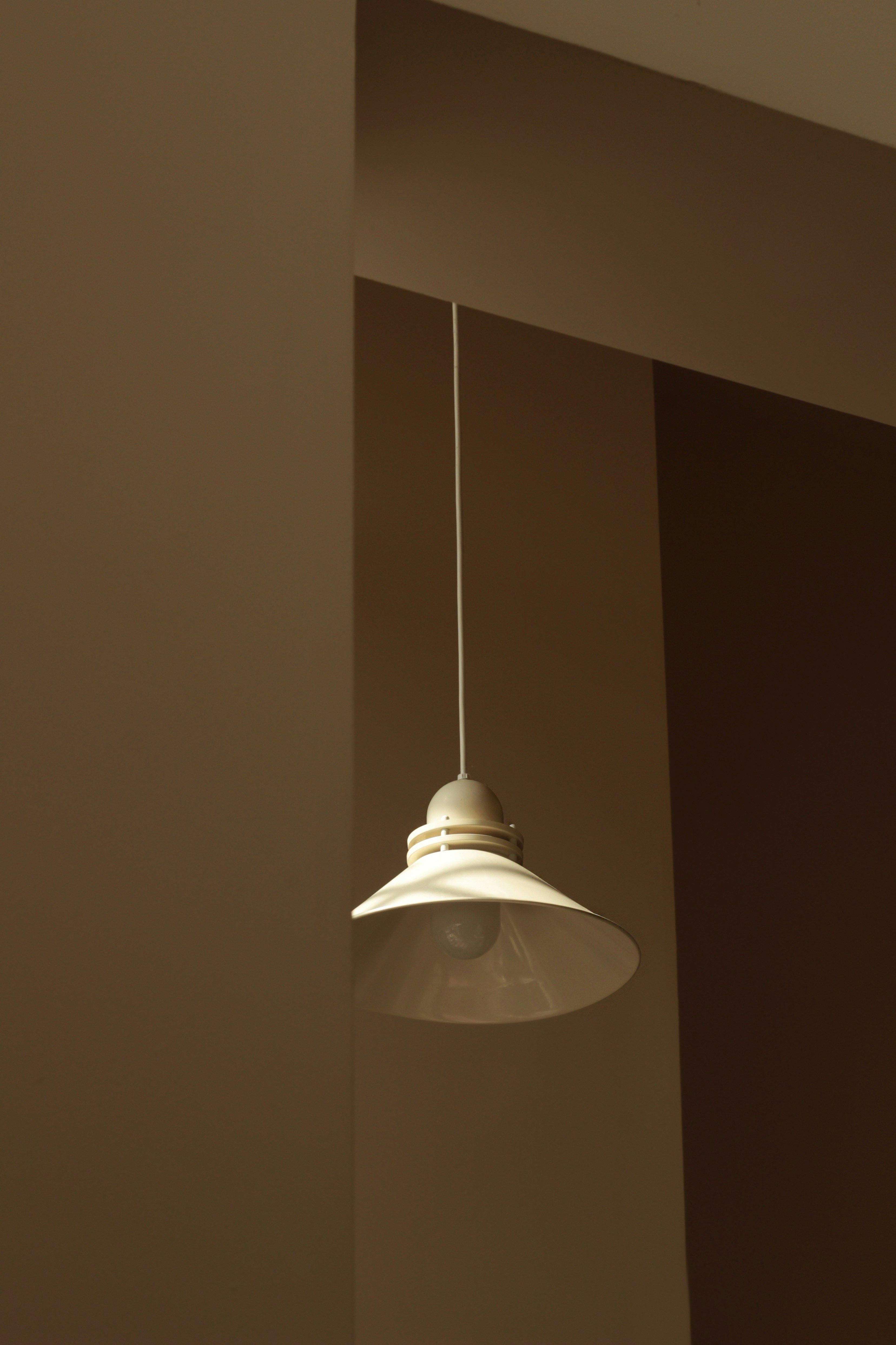 A light fixture from a ceiling photo – Free Beige Image on Unsplash