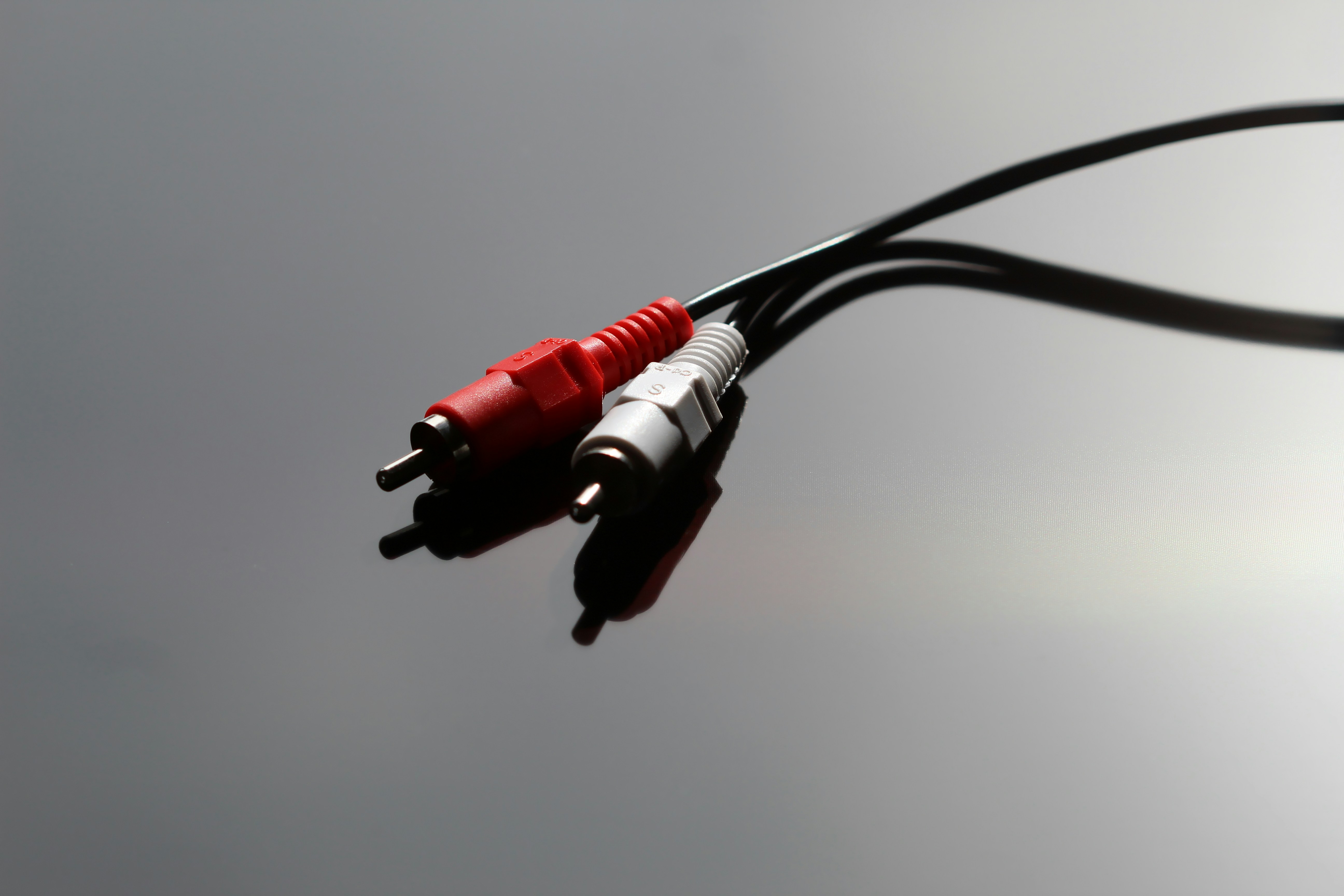 A close-up of a black and red cable photo – Free Brown Image on Unsplash