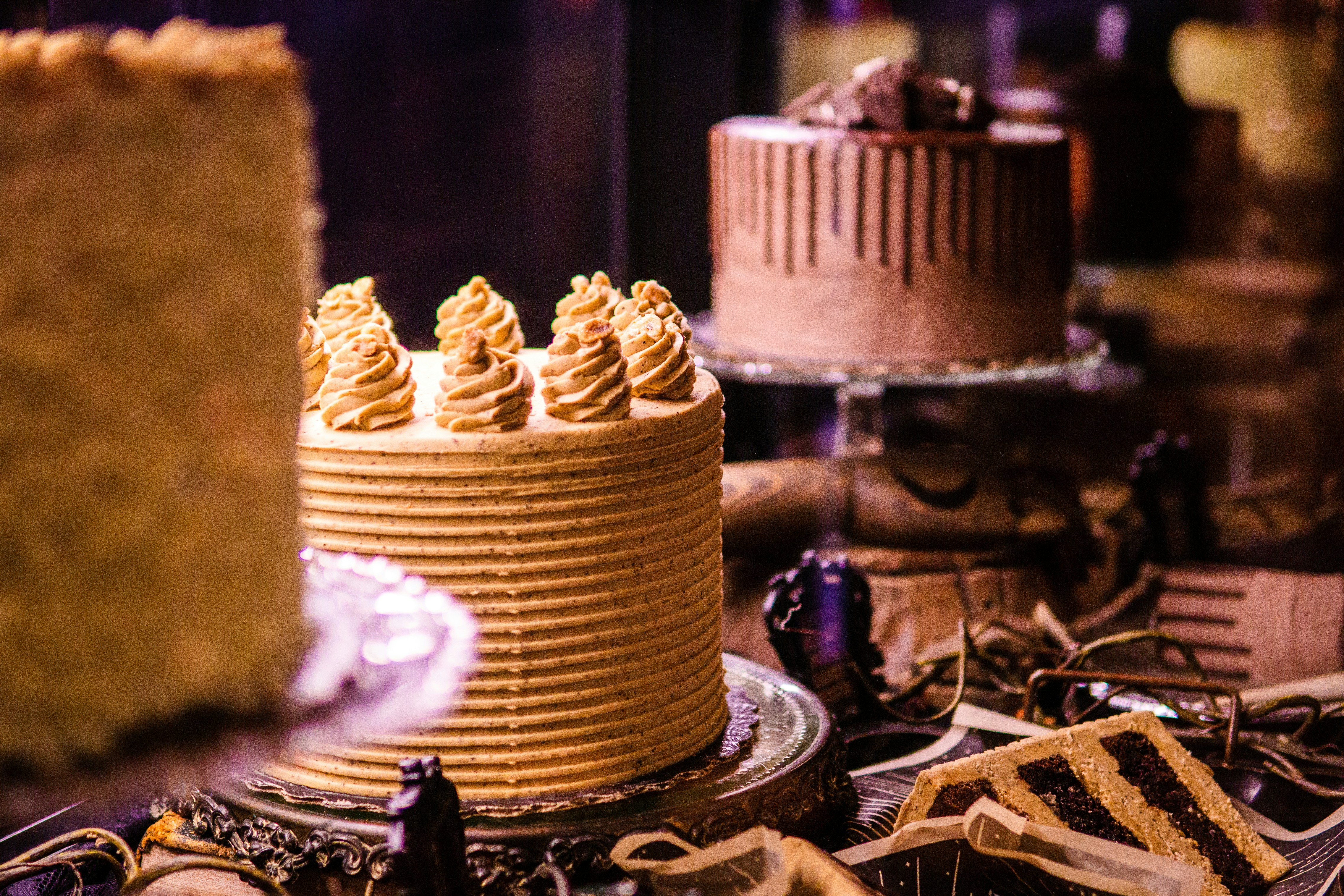 A couple of cakes sit on a table photo – Free Cake Image on Unsplash
