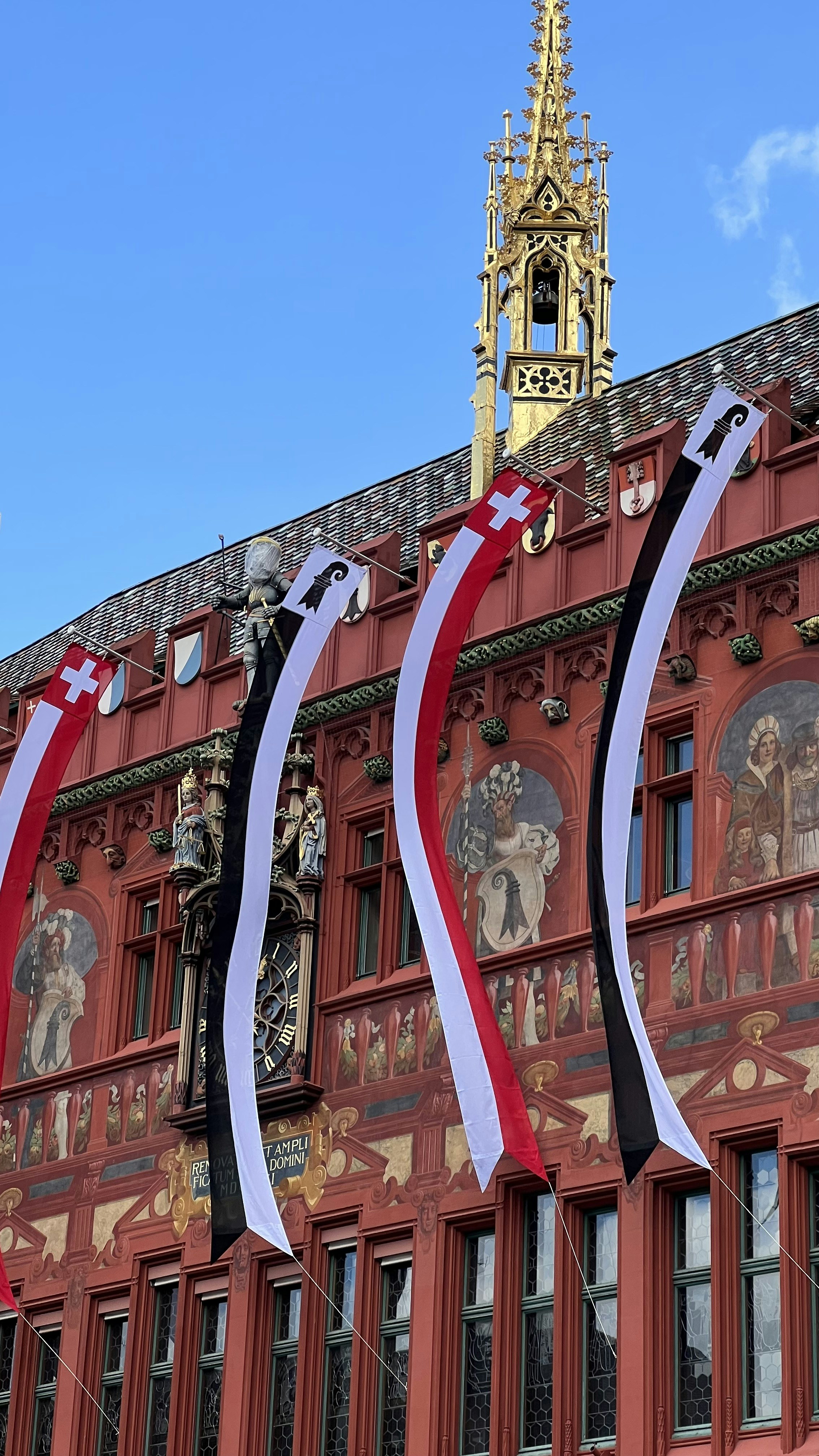 A large building with a clock tower photo – Free Basel Image on Unsplash