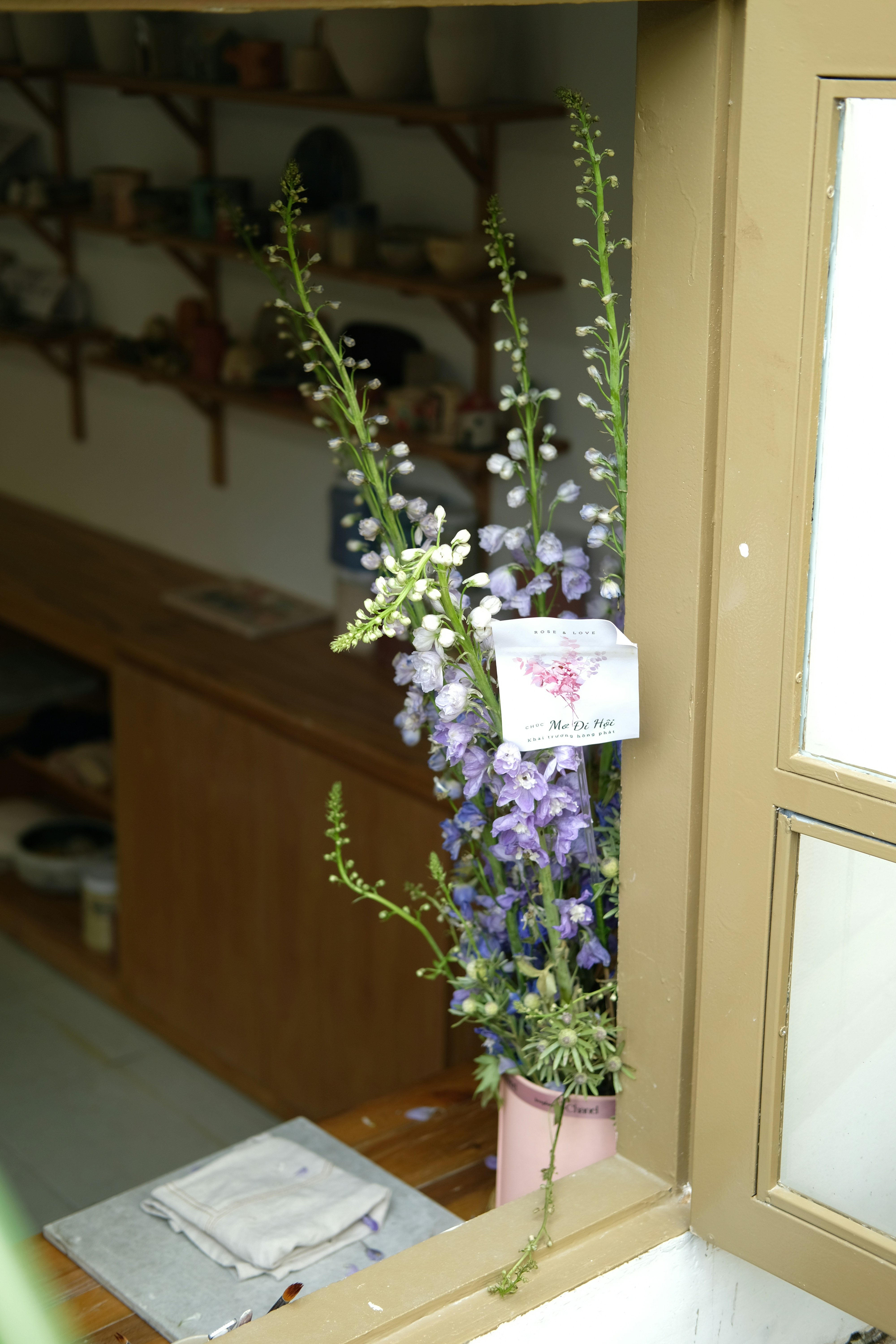 a vase with purple flowers