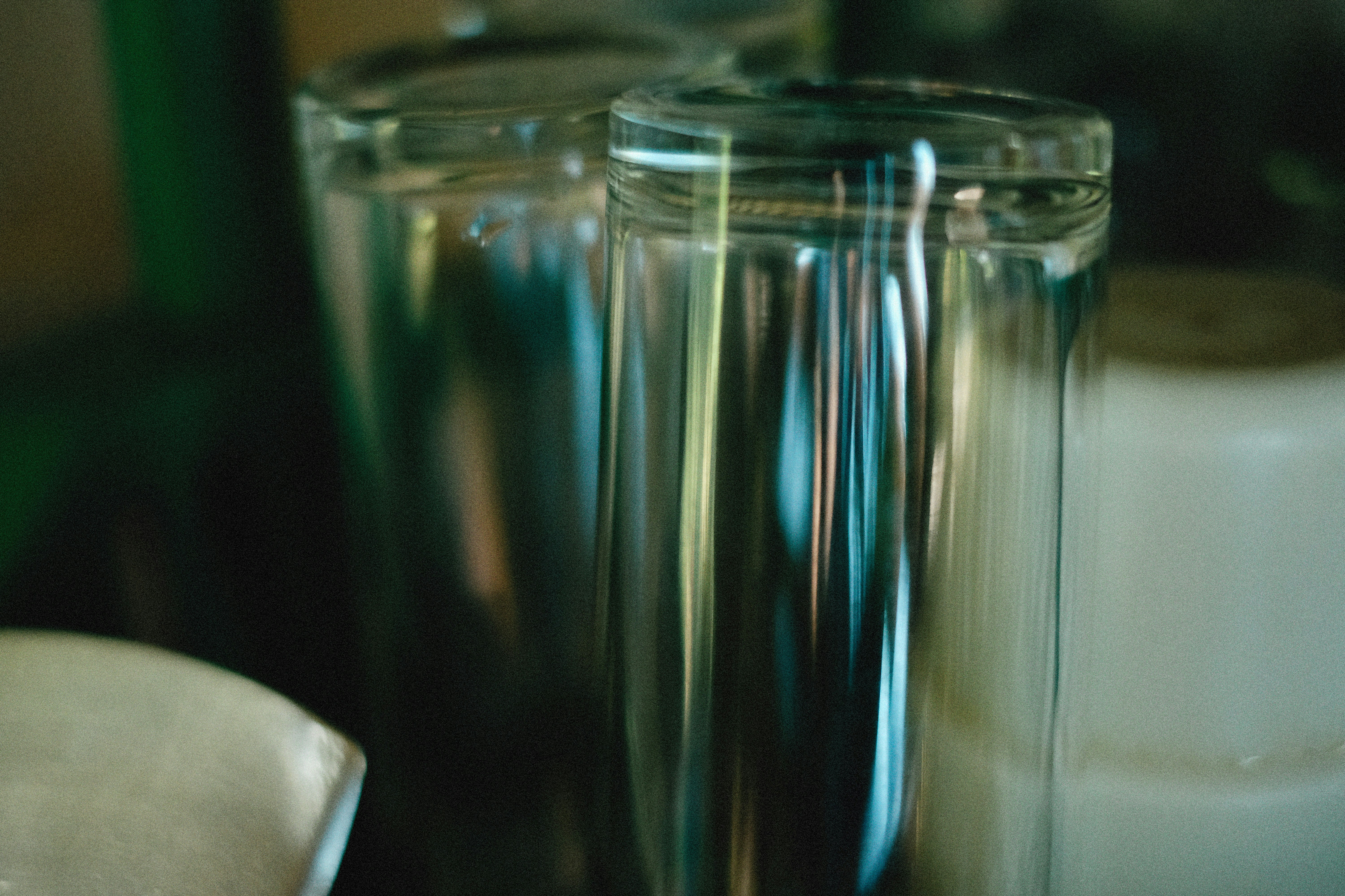 Glass Echoes: Vertical Light Play Across a Quiet Still Life