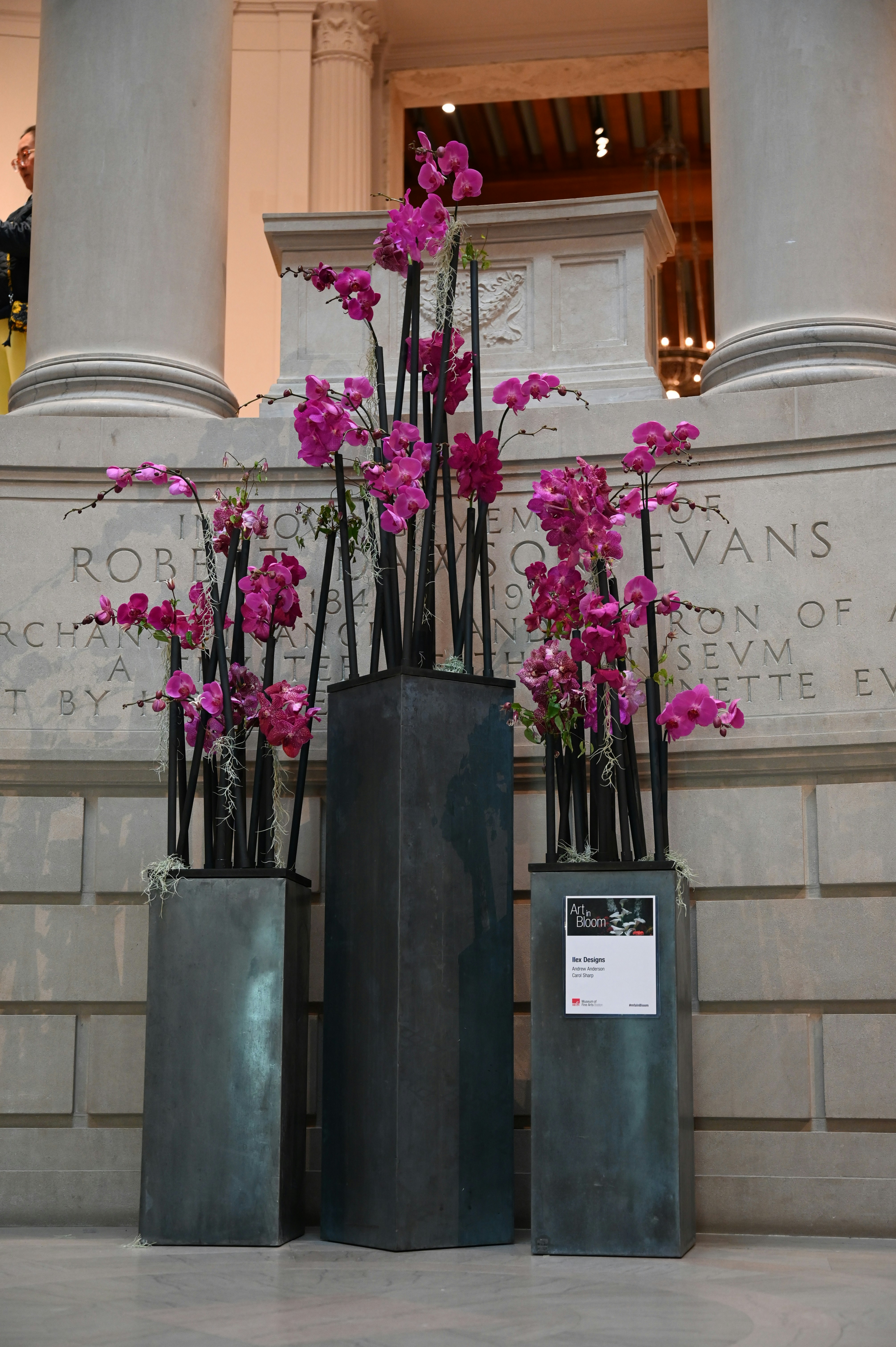 Vertical Florals: Magenta Orchids Framing Marble Monoliths