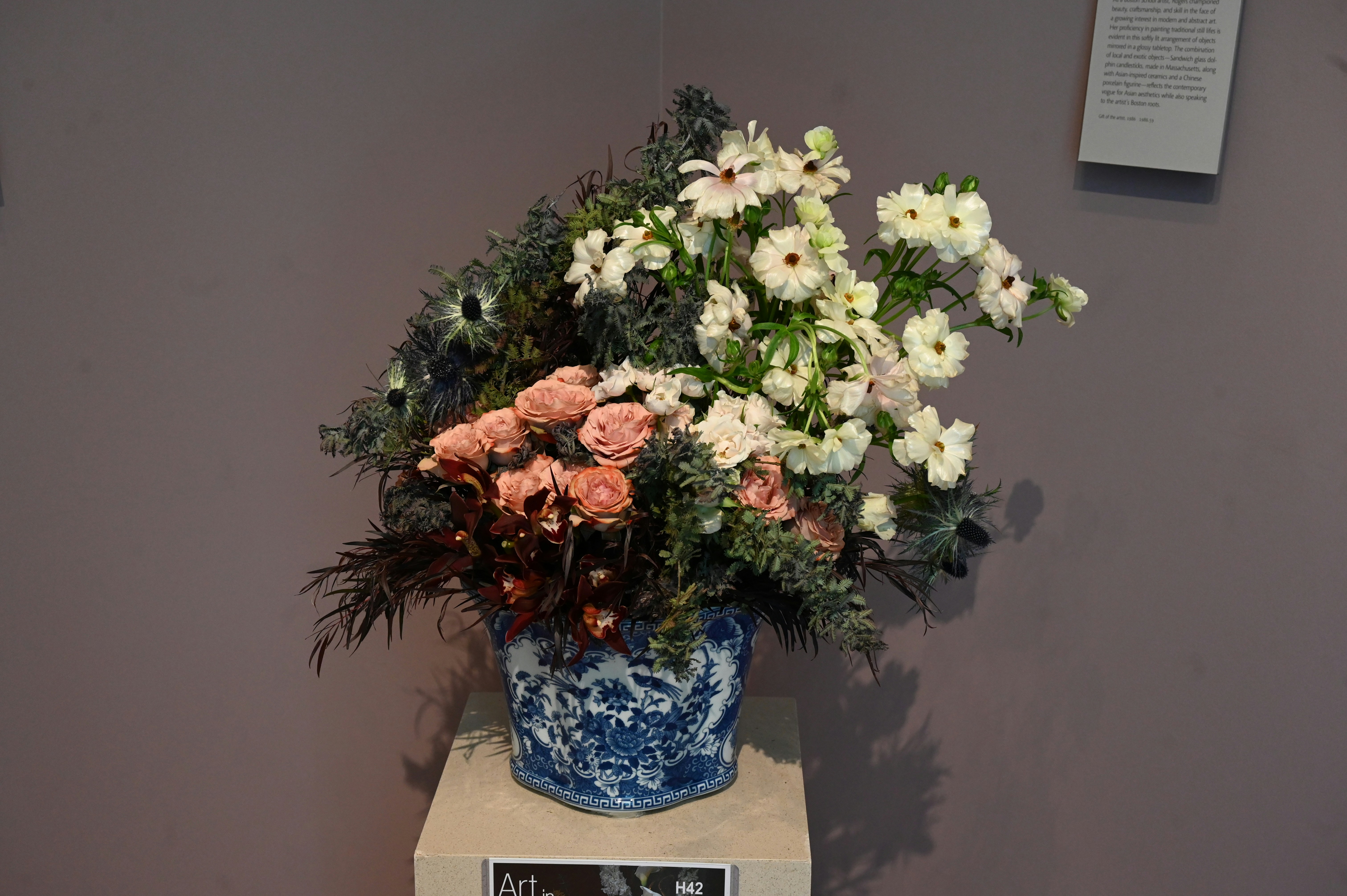 Delft Reverie: Roses, Daisies, and a Blue-White Vase on a Pedestal