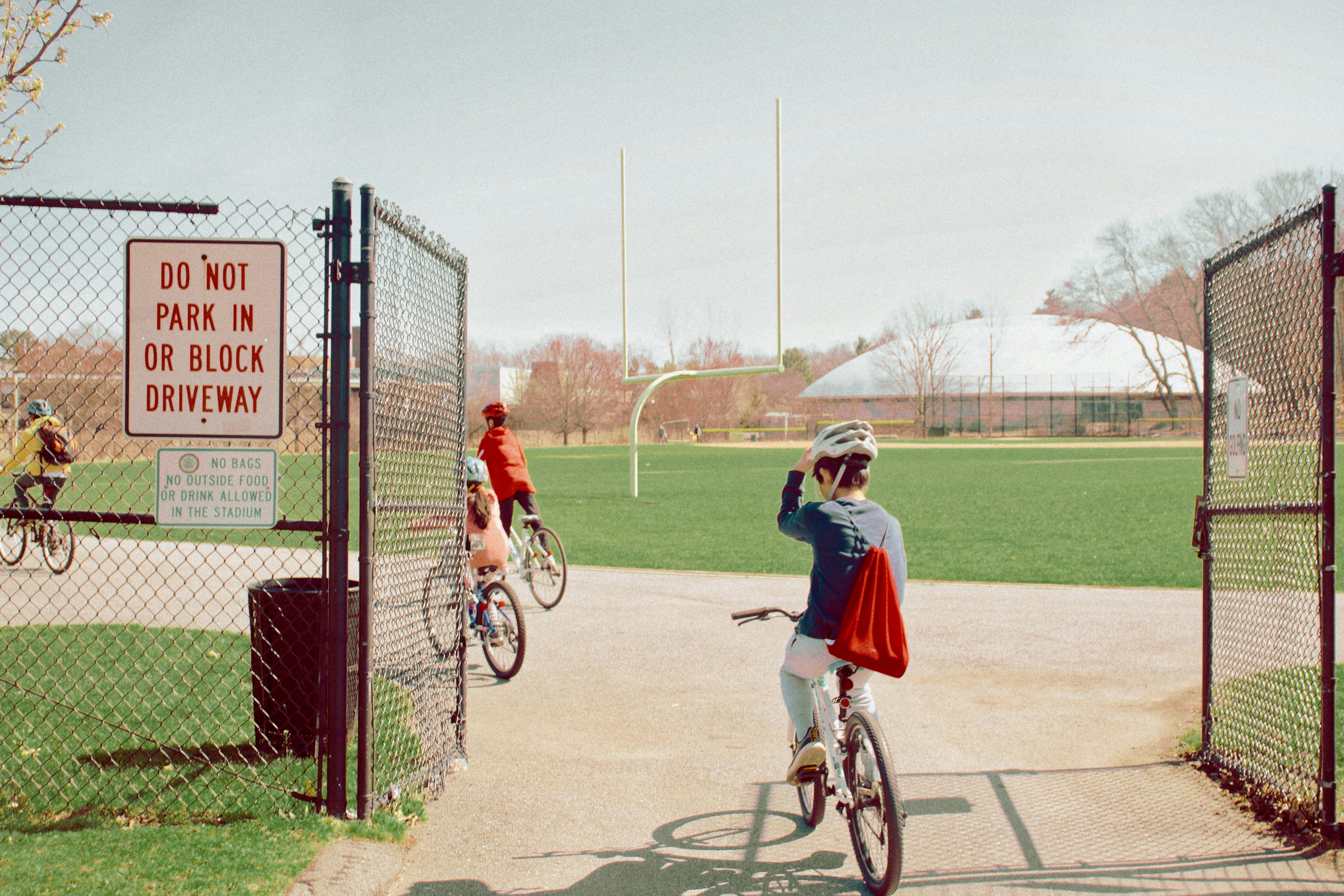 A group of people riding bikes photo – Free Grey Image on Unsplash