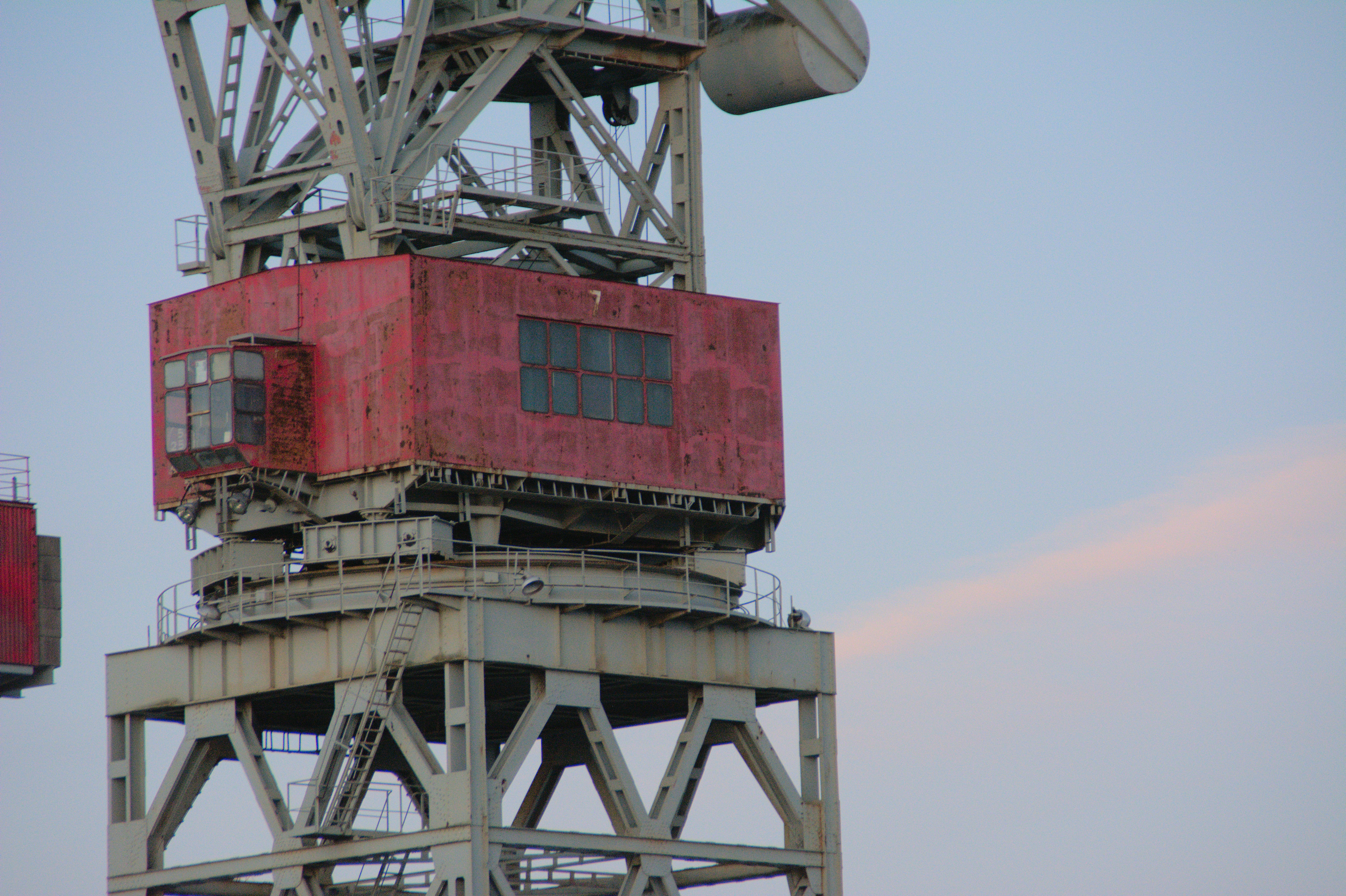 A large red and white tower photo – Free Crane Image on Unsplash