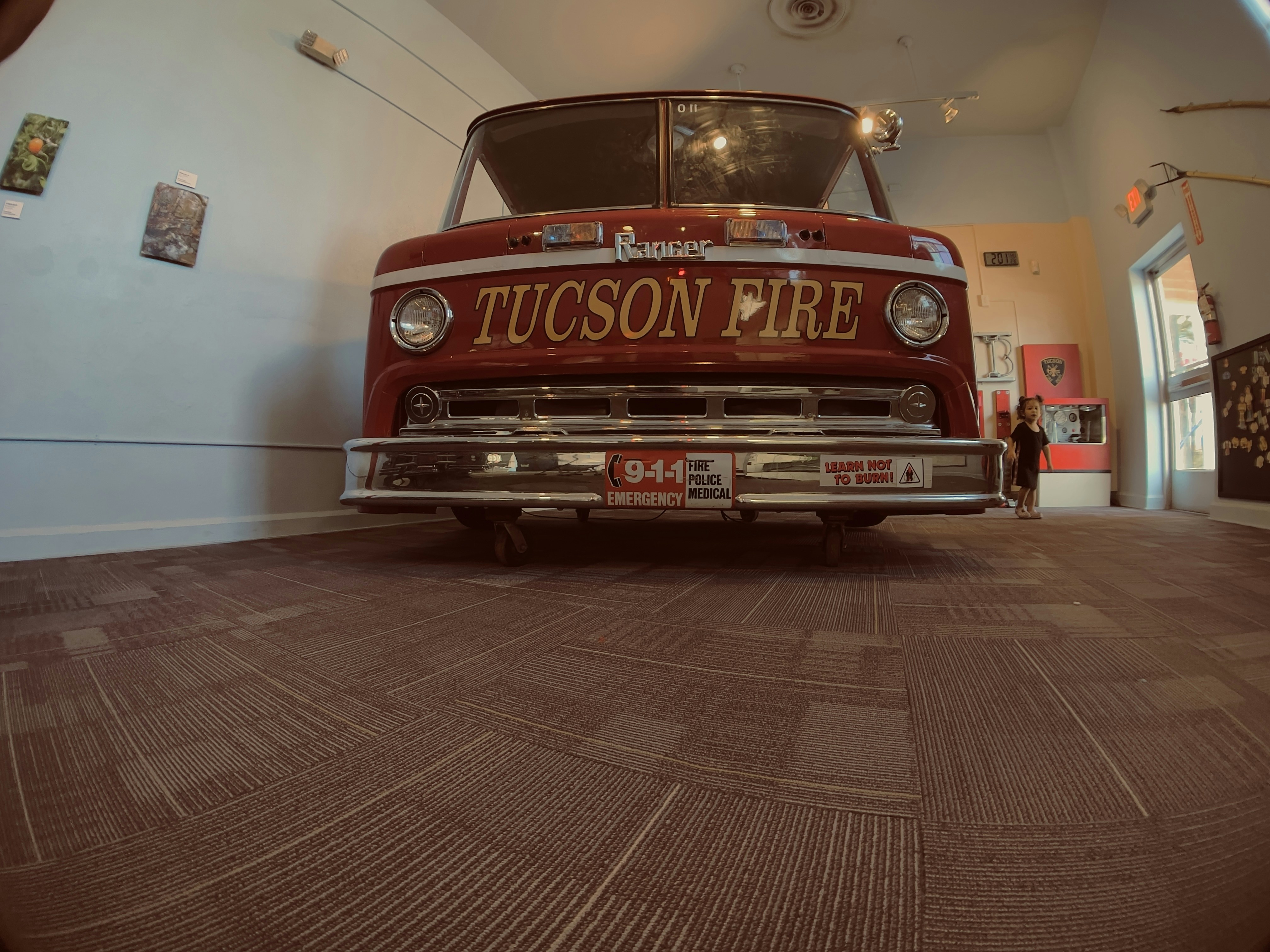 Front and Center: A Vintage Tucson Fire Engine Anchored in Museum Light