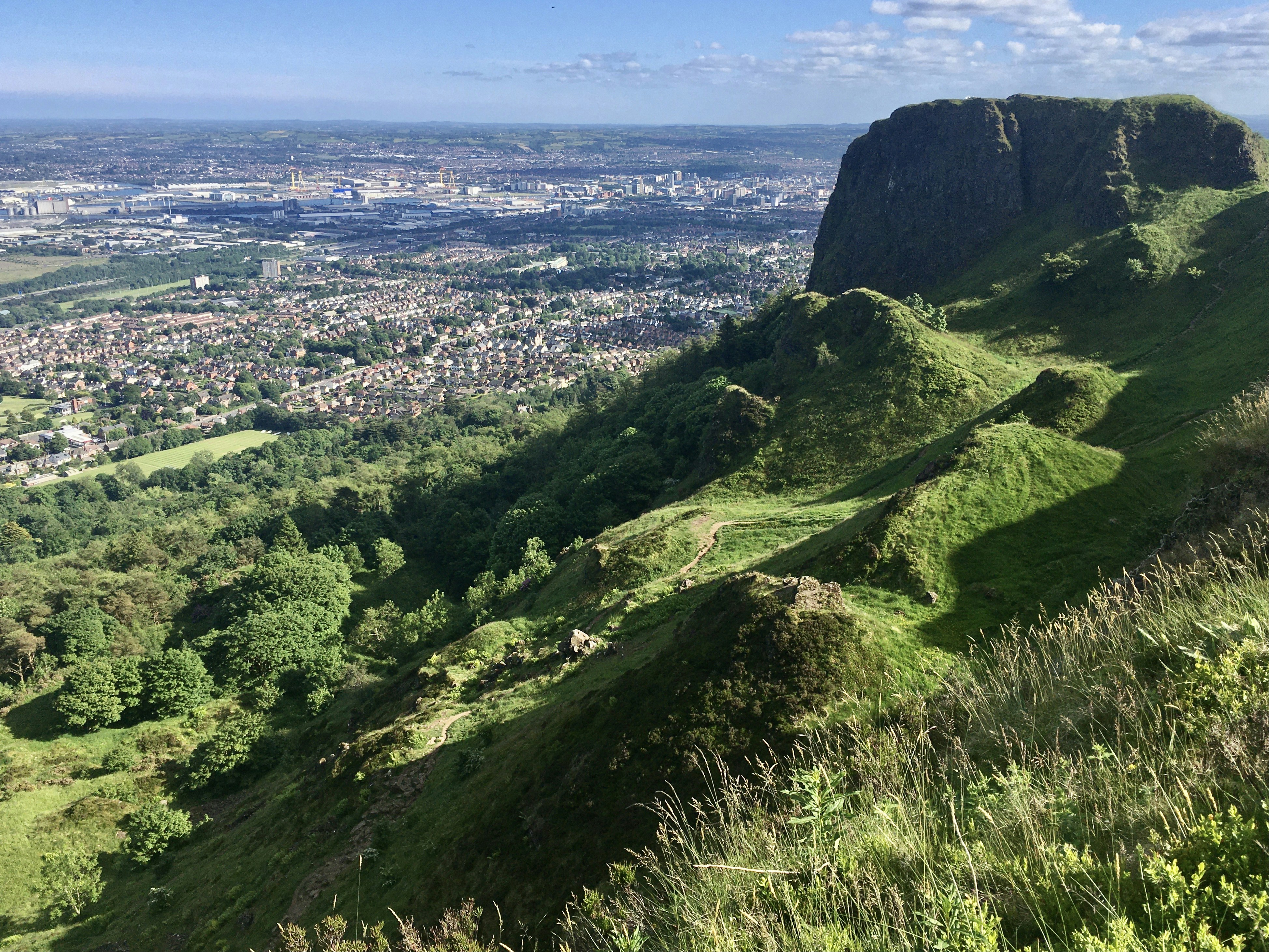 Overlook, cliff, view | a landscape with hills and trees