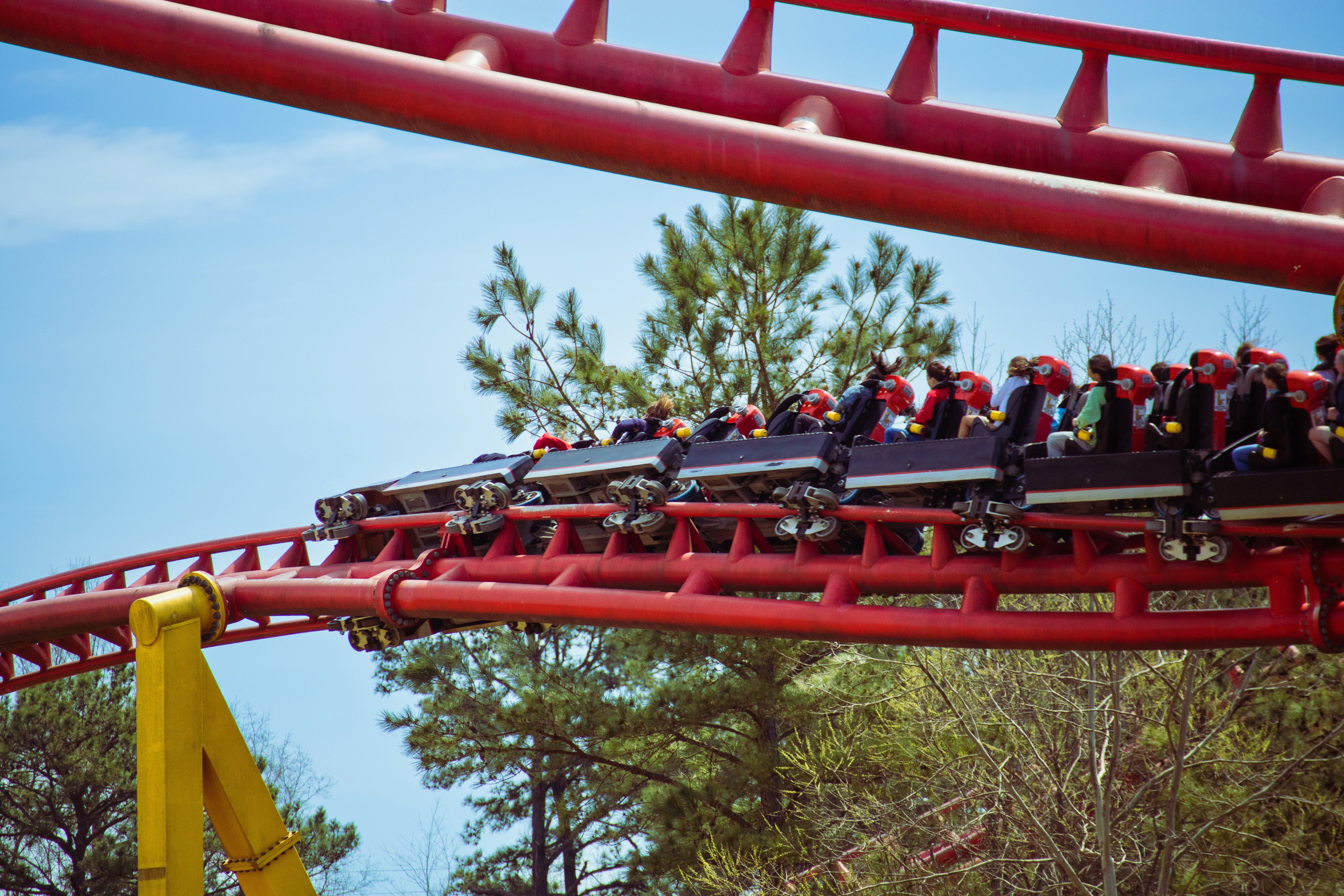 A group of people riding a roller coaster photo – Free Kings dominion ...