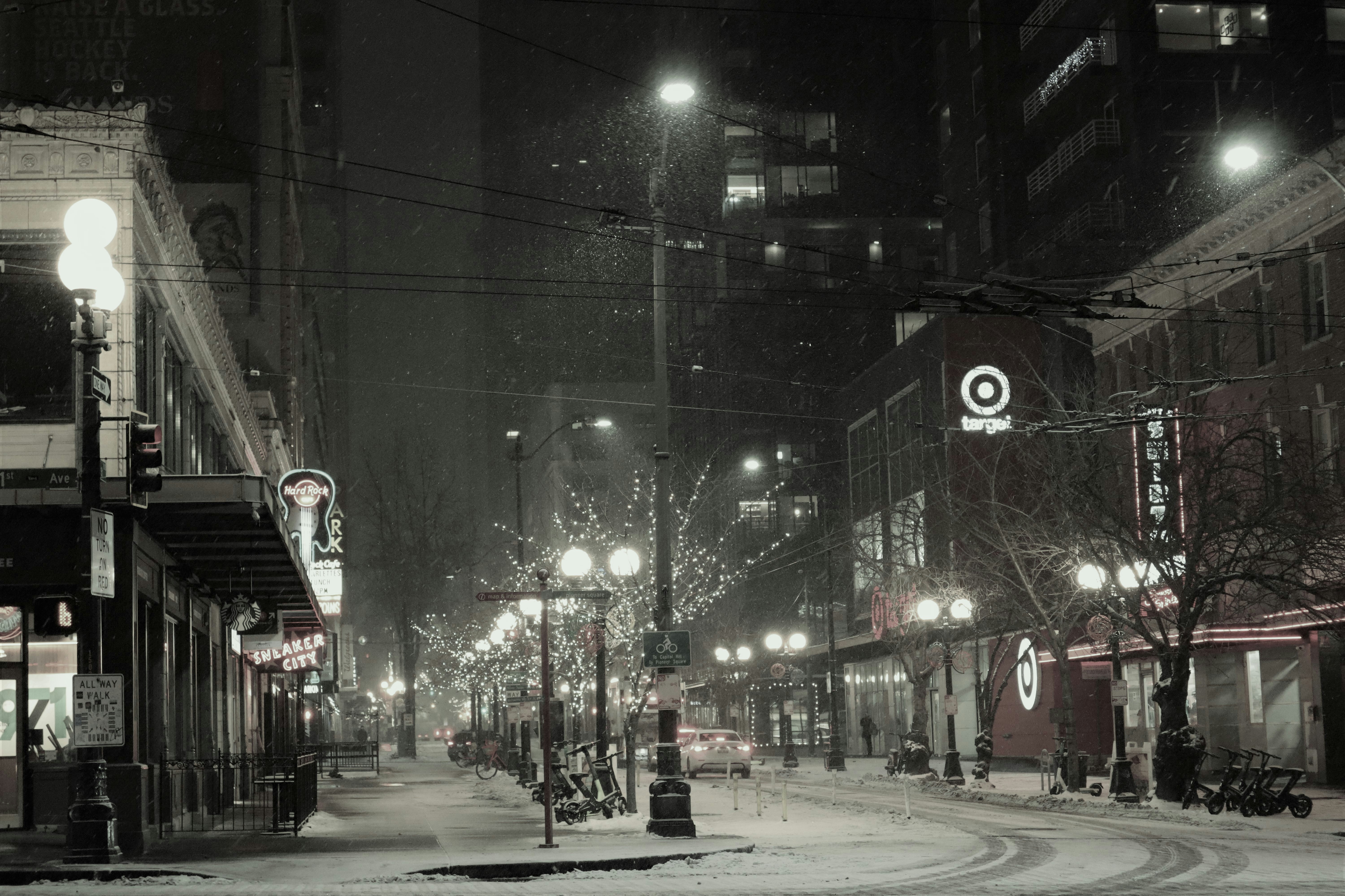 Snowfall and Neon: A Quiet City Street at Night