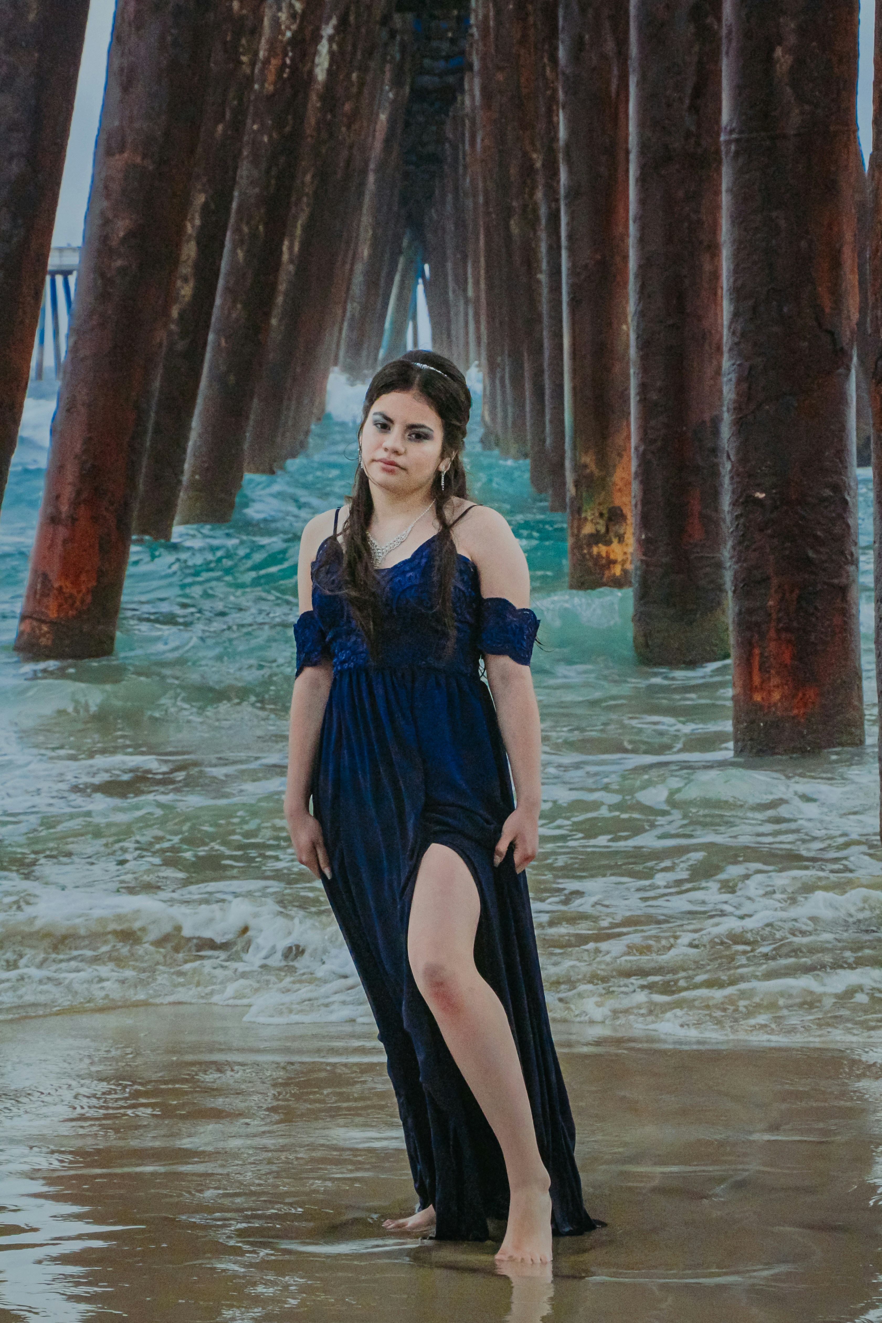 Under the Pier: Quiet Portrait in Blue Velvet