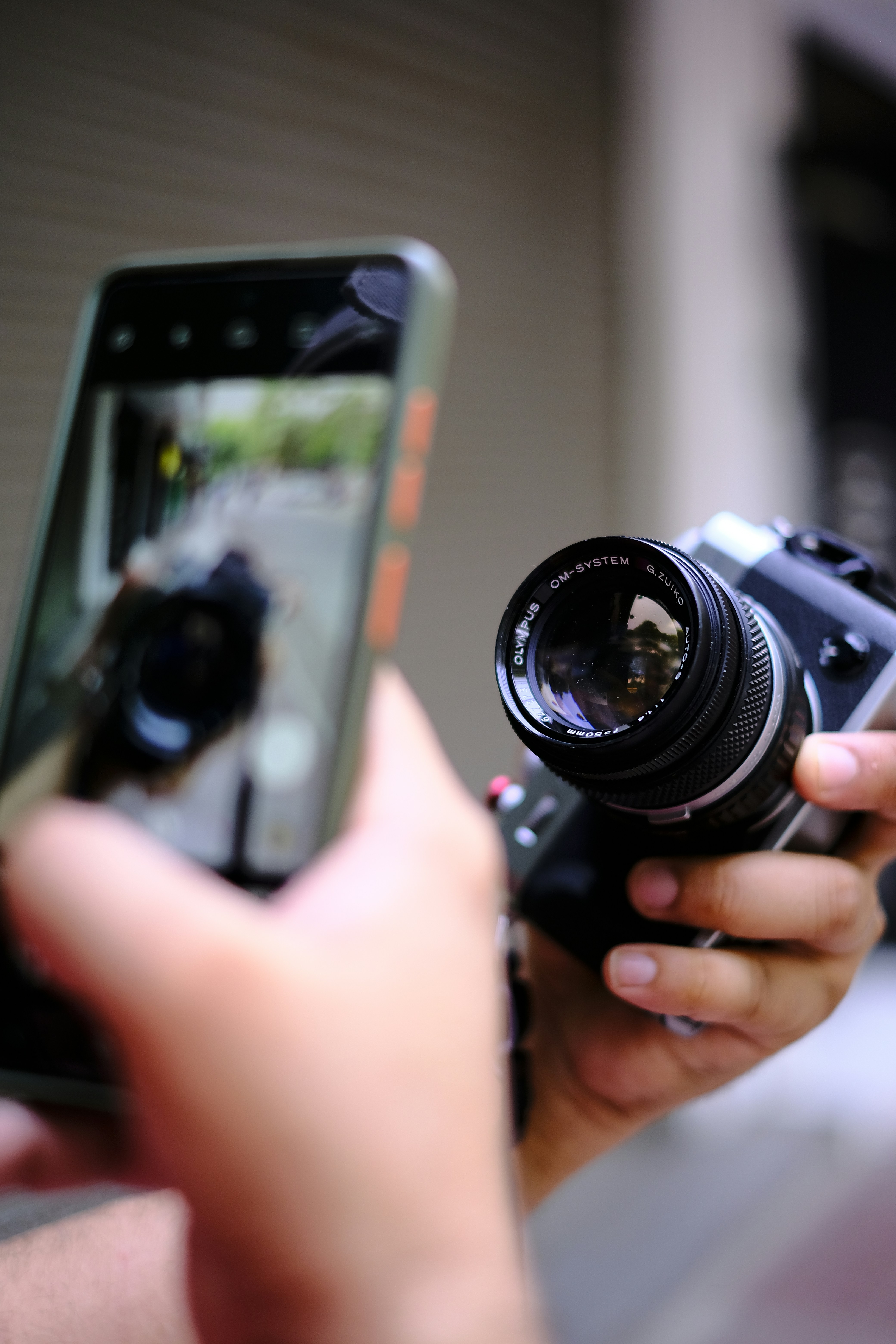 A person holding a camera photo – Free Fujifilm Image on Unsplash
