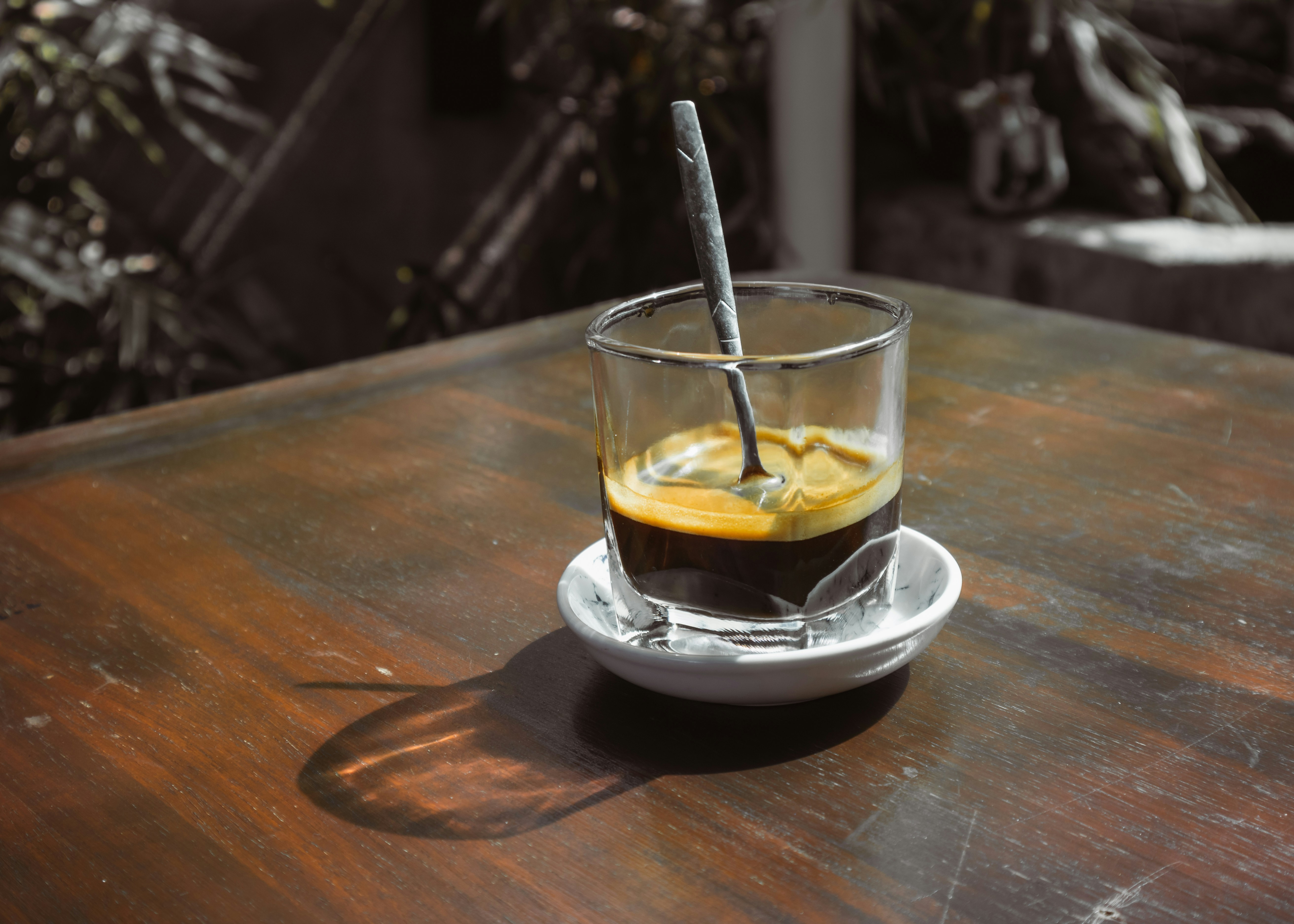 Sticky Dusk Espresso on a Weathered Table