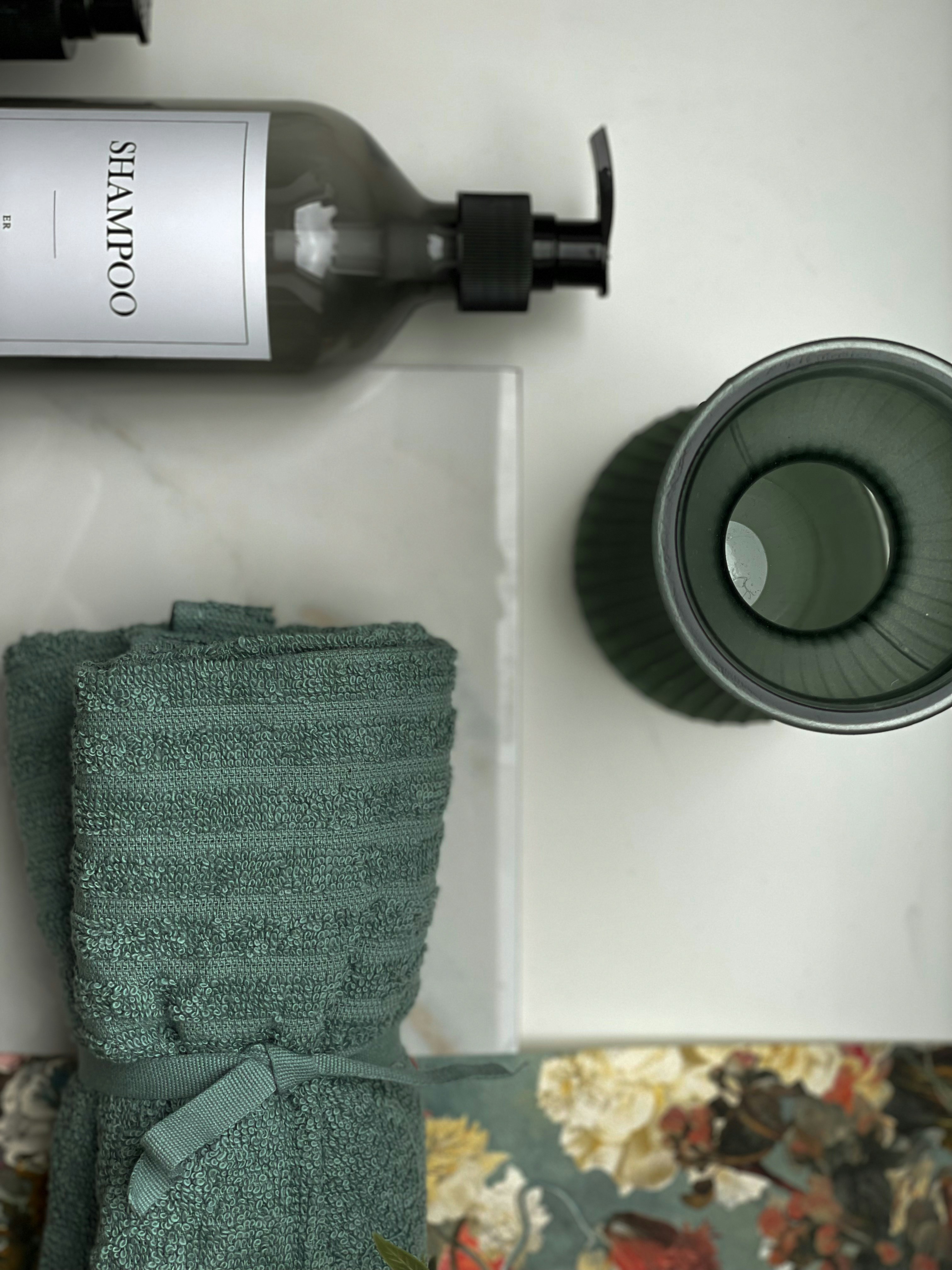 Teal Textures on Marble: A Quiet Countertop Still-Life