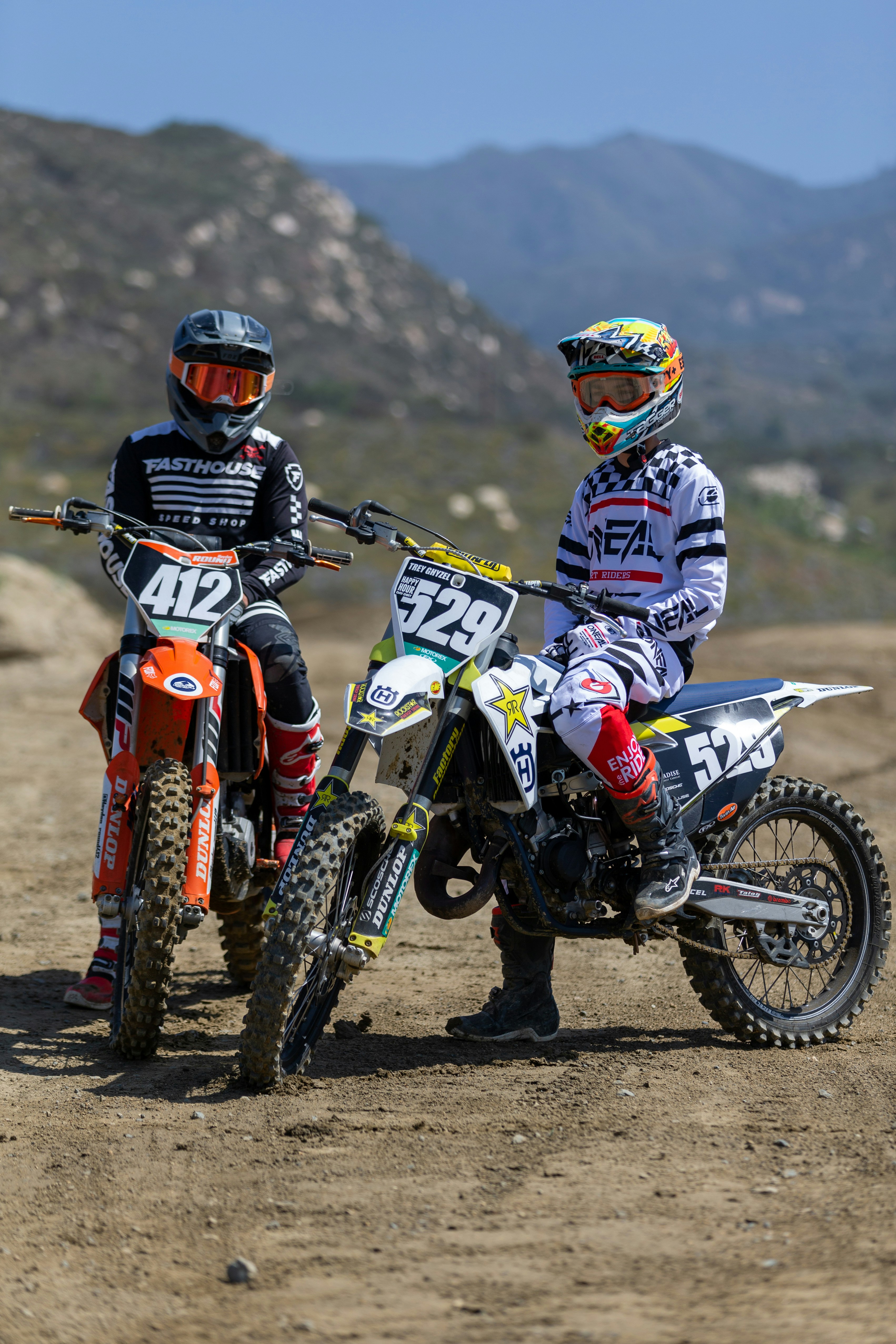 Dust Trail Trio: Three Motocross Riders Rally on a Desert Track