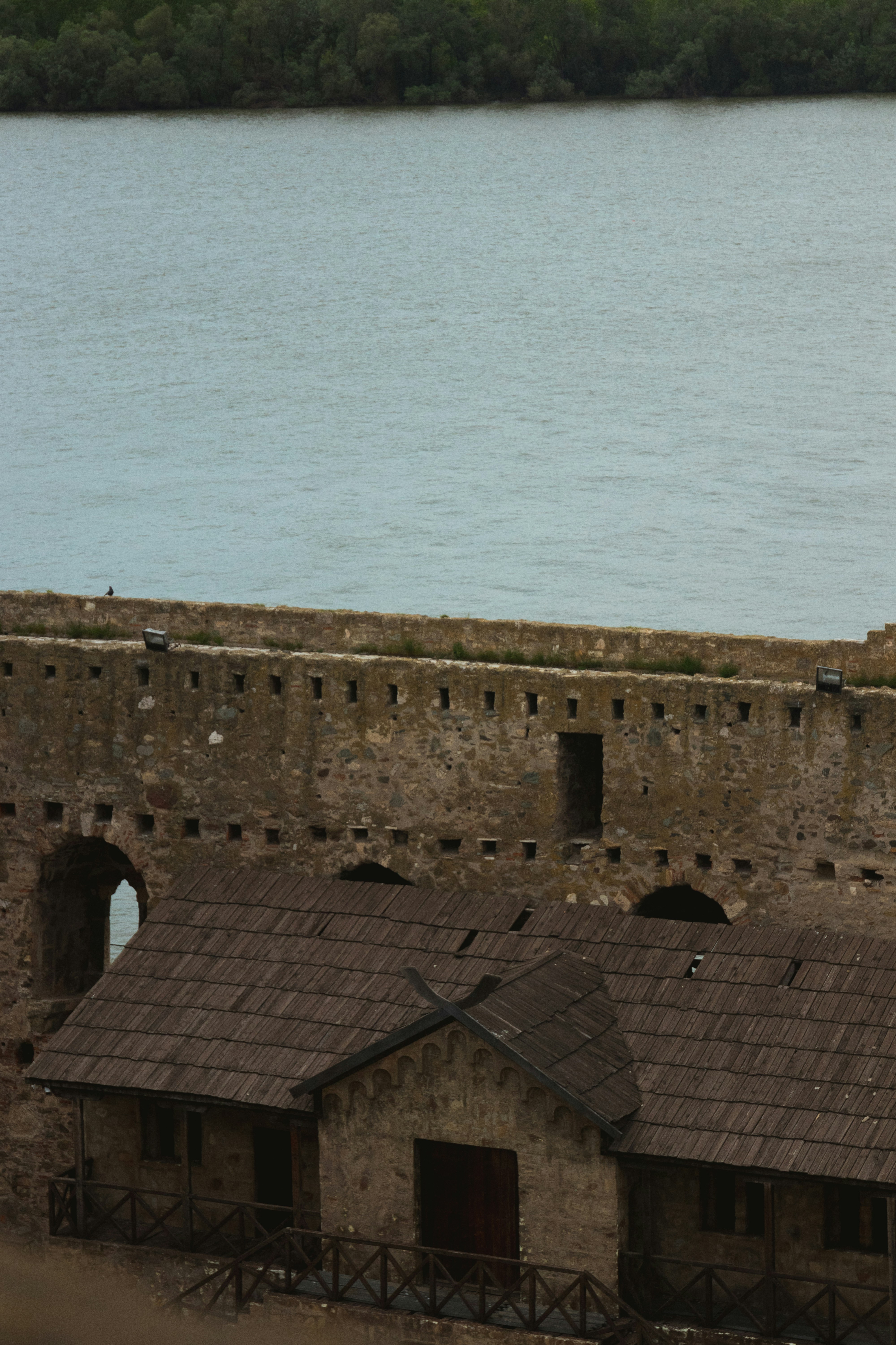 a building next to a body of water