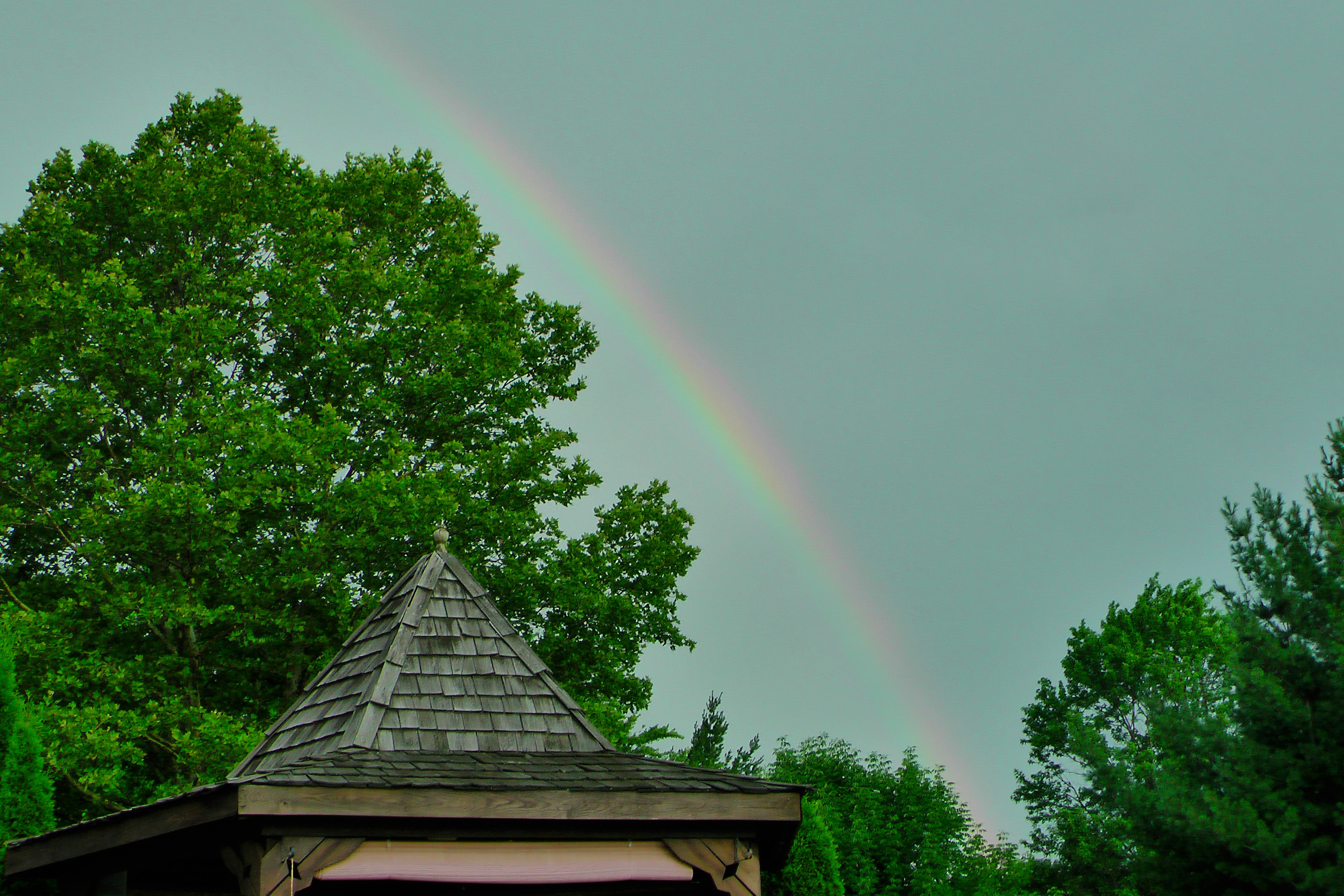 A rainbow over a house photo – Free Nature Image on Unsplash