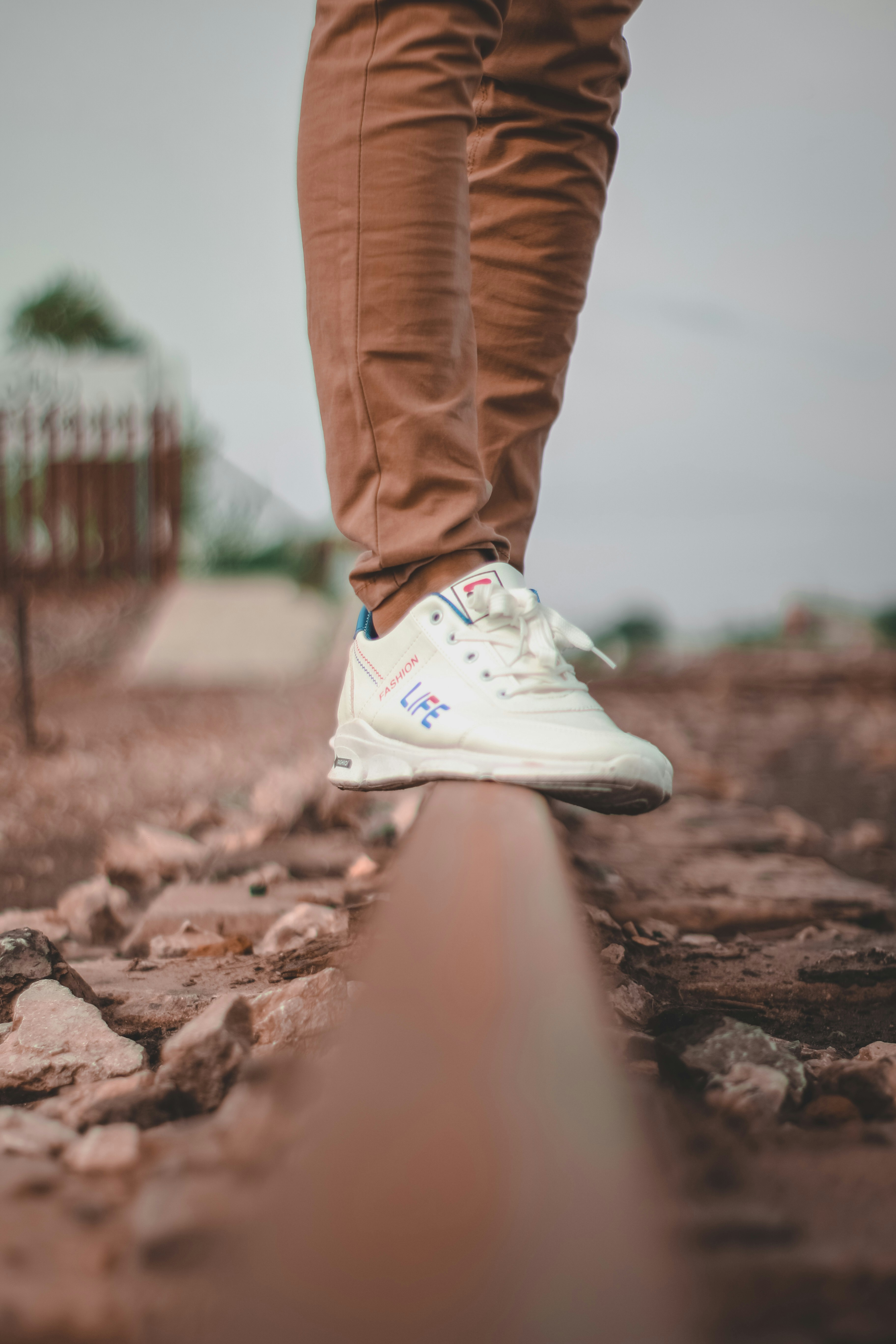 Balance on the Rails: A Sole on the Track
