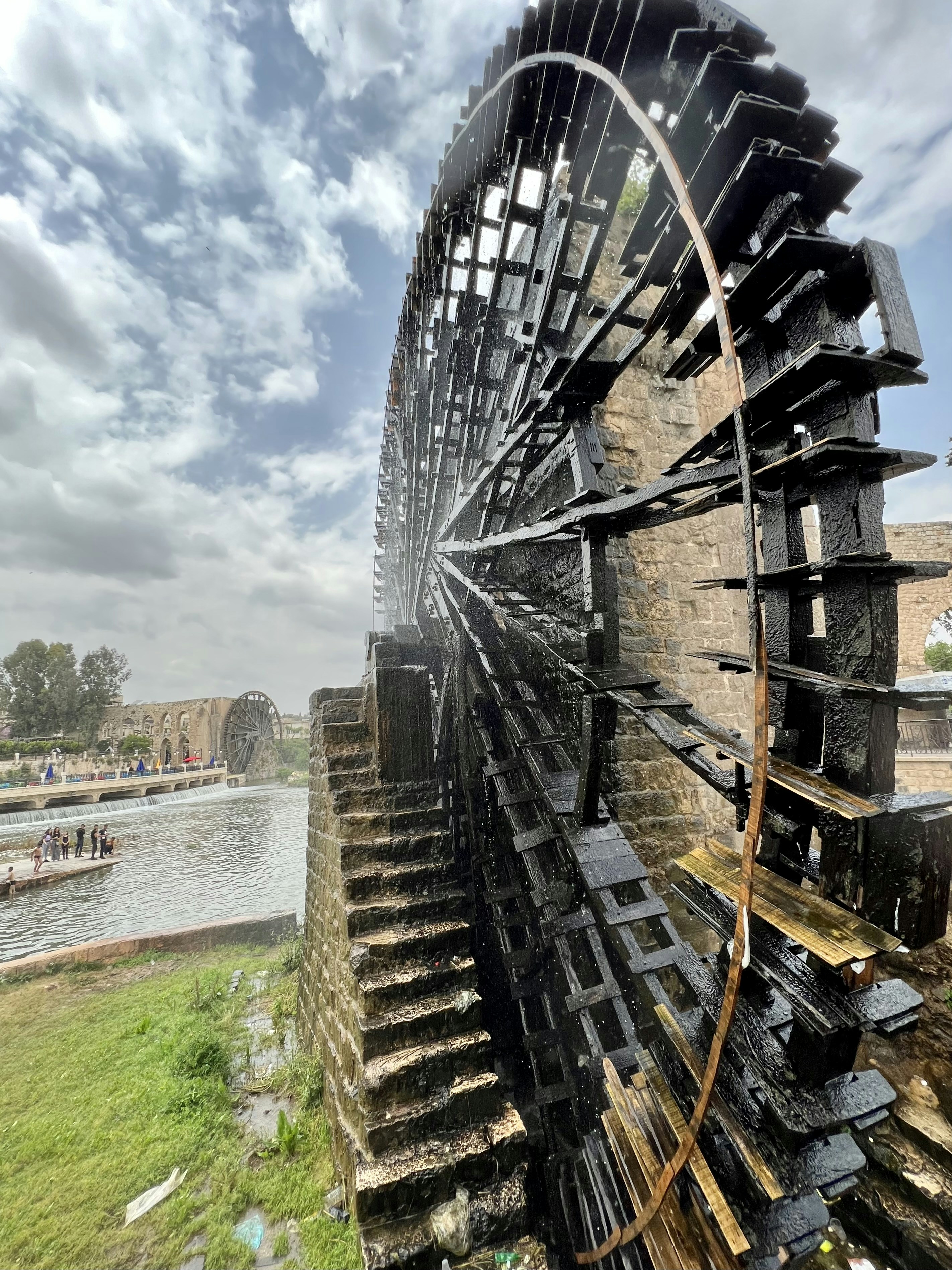 Circling Shadow: The Iron Water Wheel by the Riverside Arch