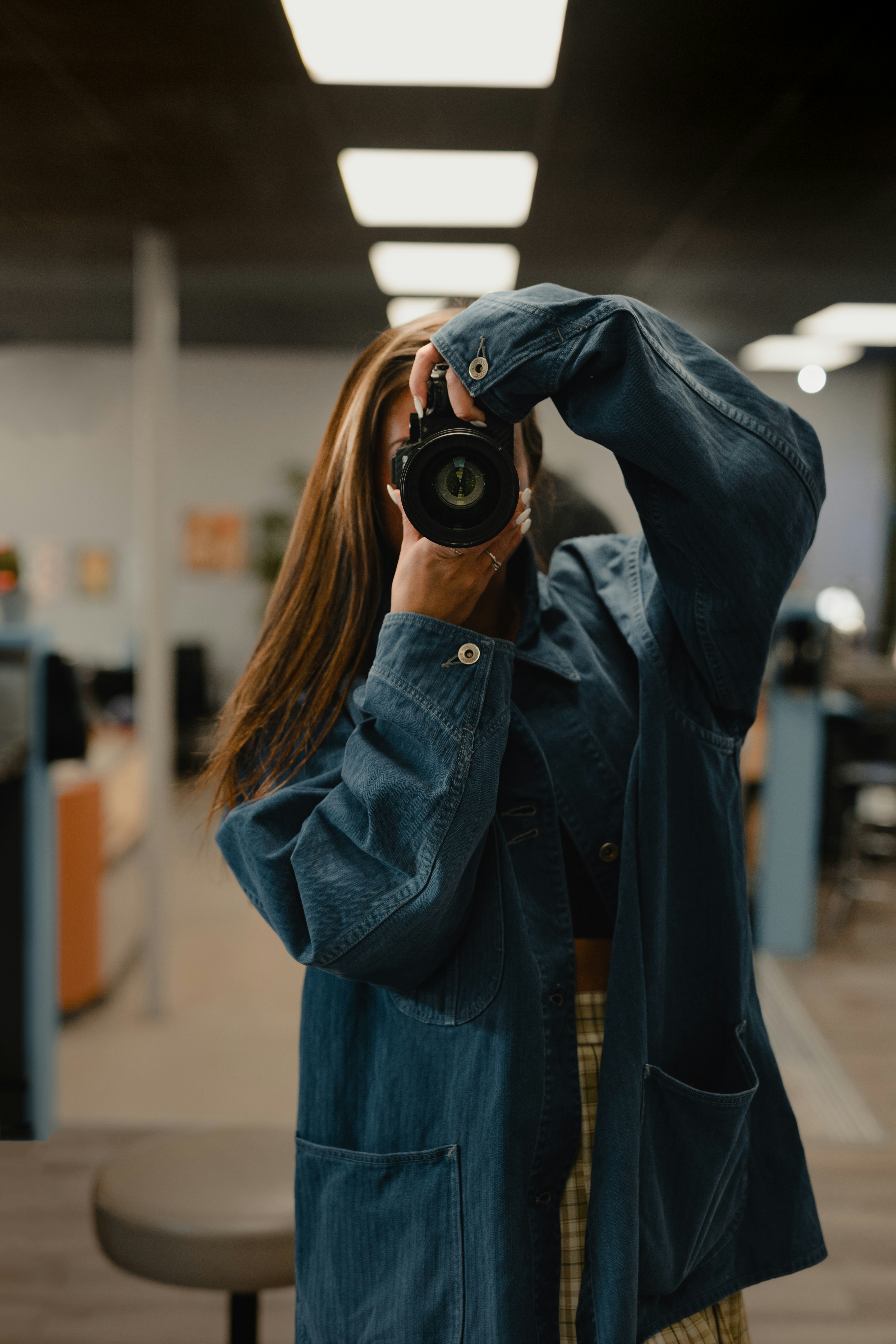 The Look Through the Lens: A Portrait in a Photographer's Moment