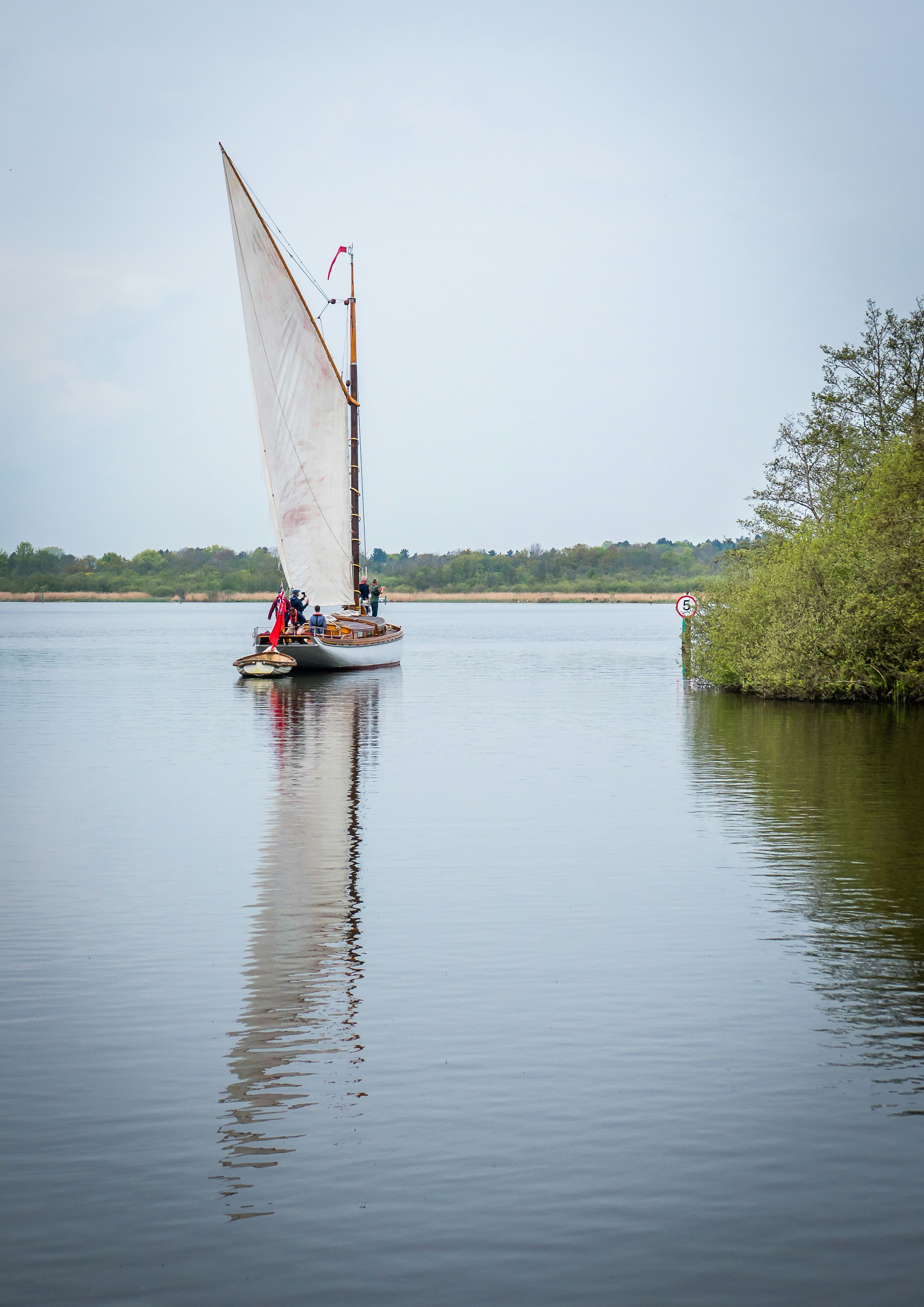 A boat on the water photo – Free Barton broad Image on Unsplash