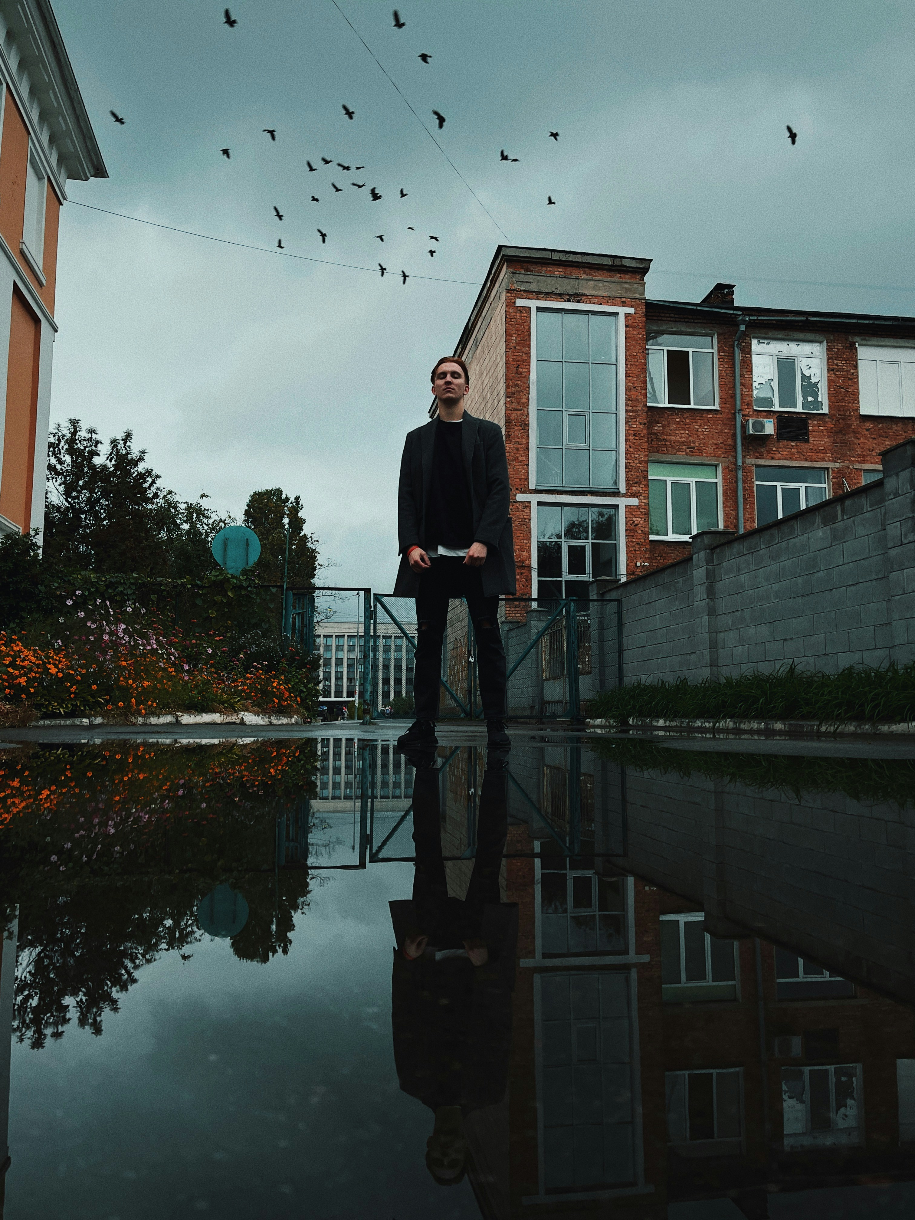 a person standing on a bridge