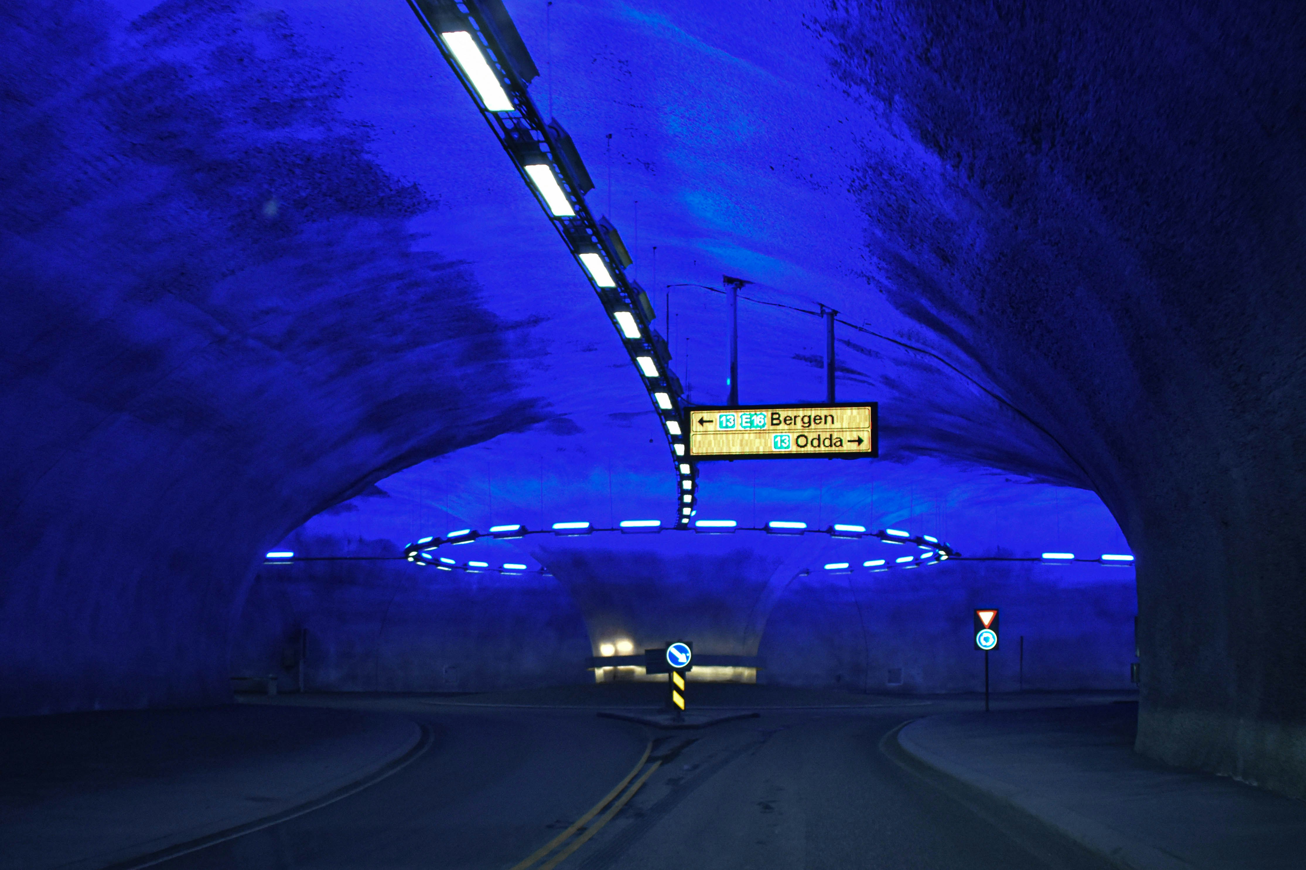 Blue Neon Tunnel: A Night Drive Toward Bergen