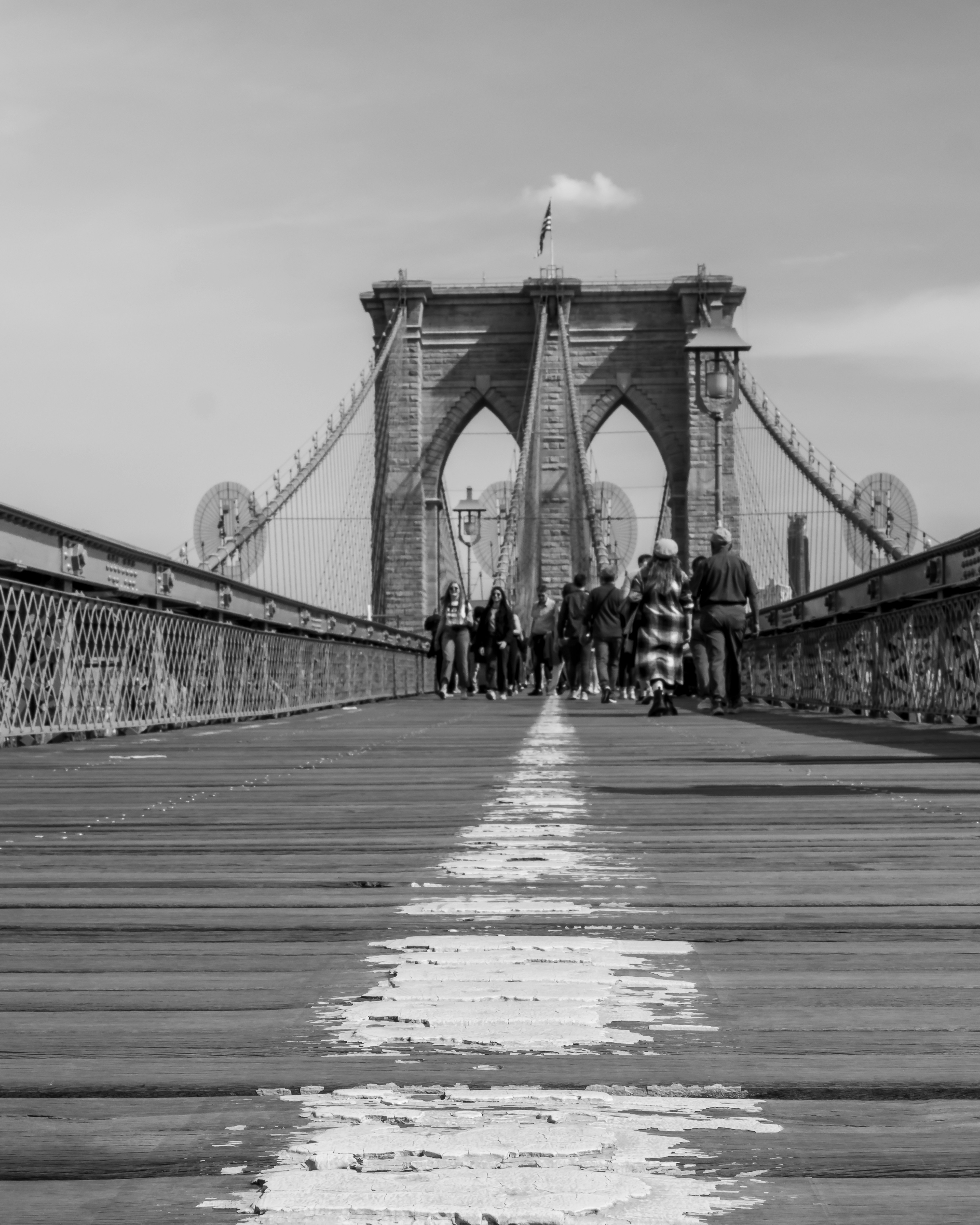 A group of people walking on a bridge photo – Free Brooklyn bridge ...