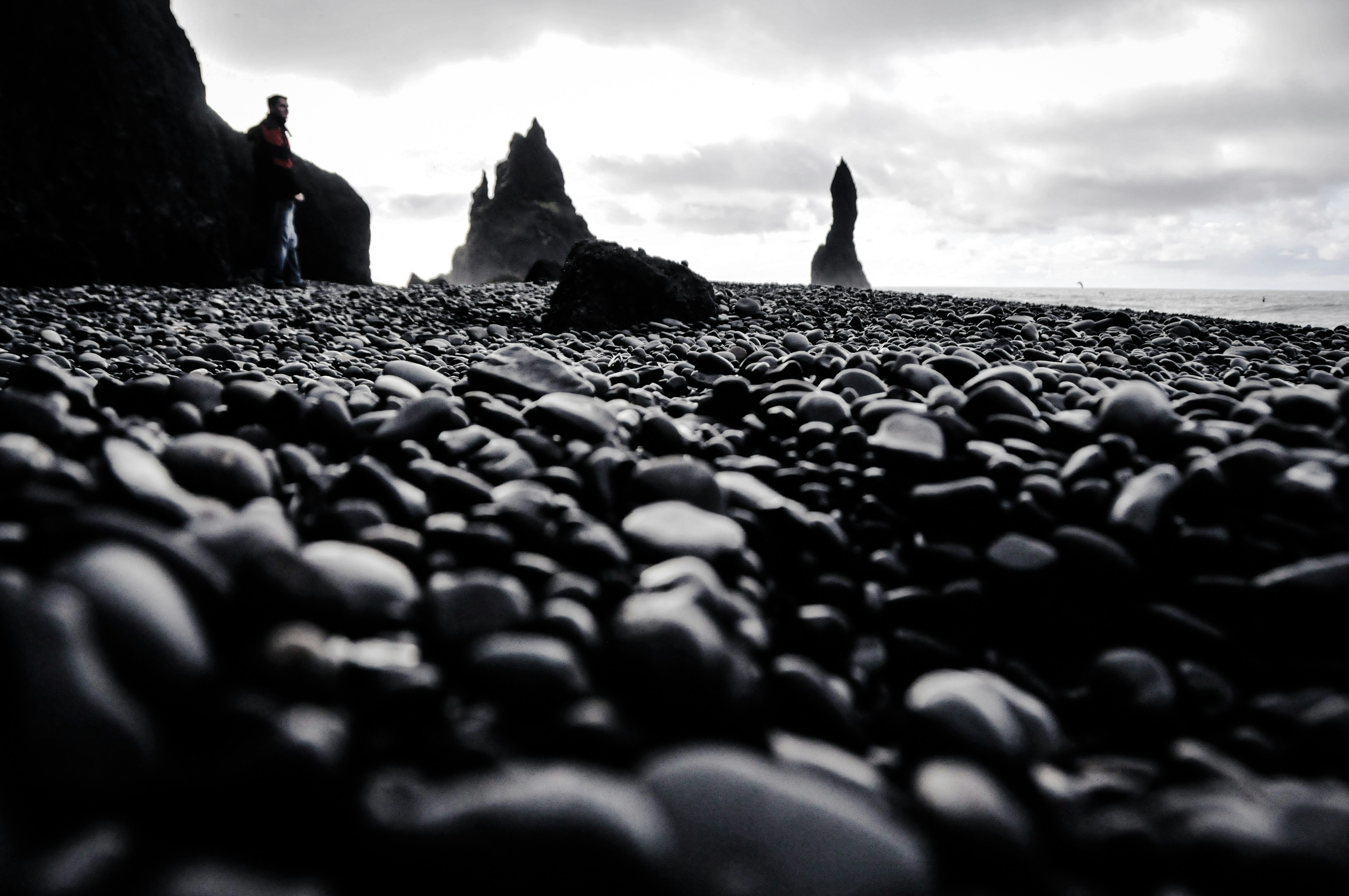 Stone Choir at Dusk: Sea Stacks Rise Over a Pebble Beach