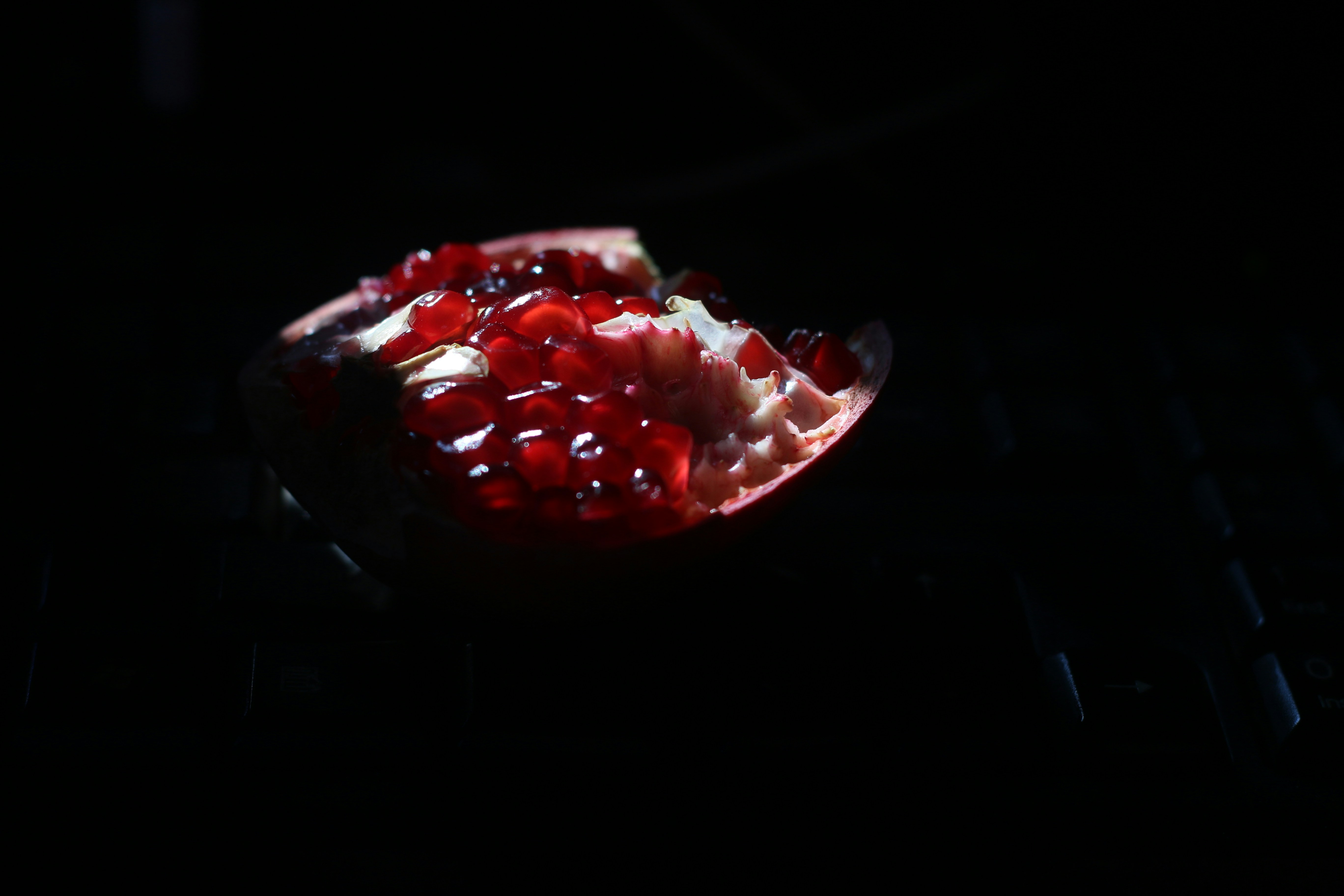 Crimson Seeded Crescent in the Dark