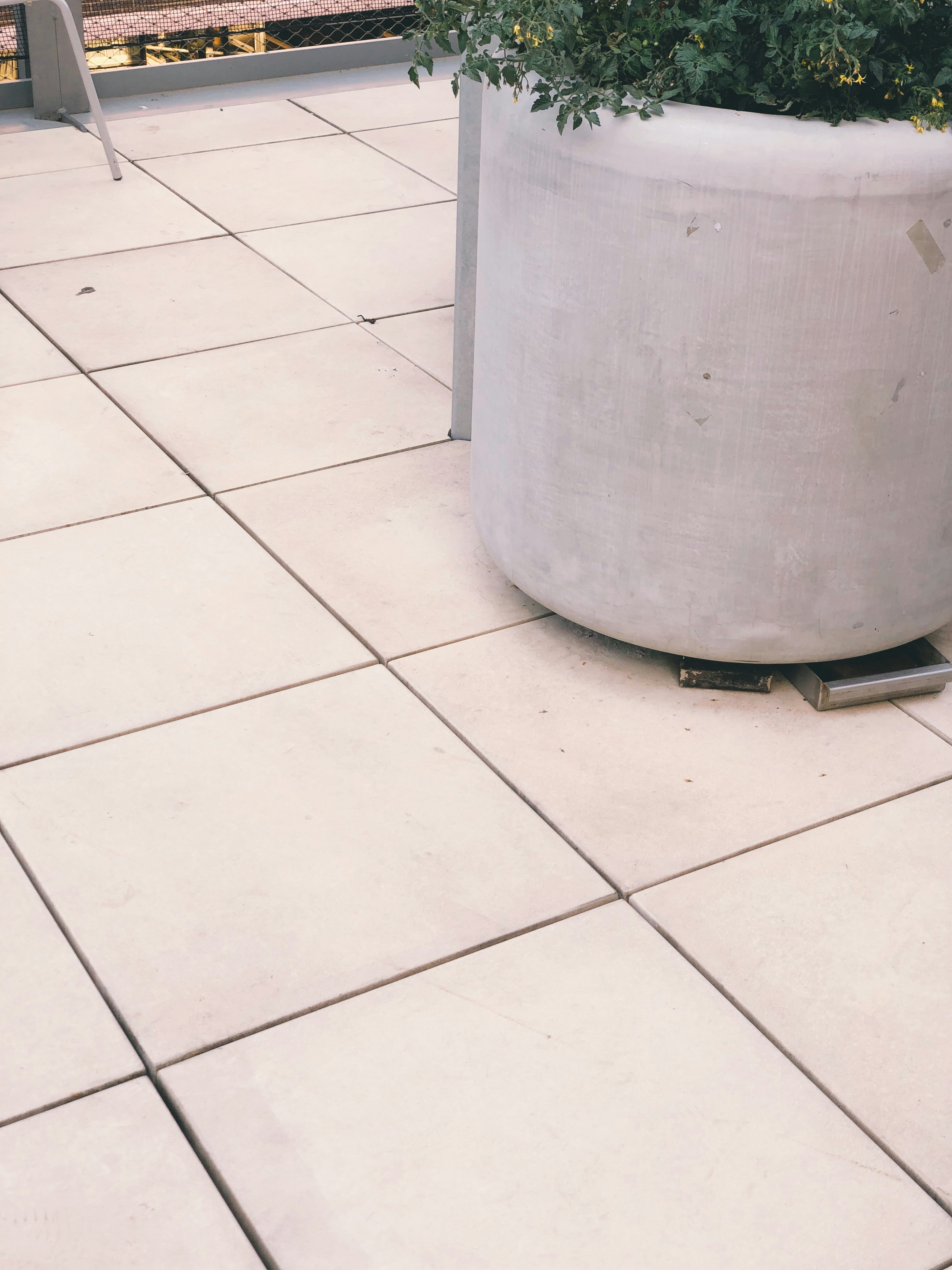 A large white container on a tile floor photo – Free Grey Image on Unsplash