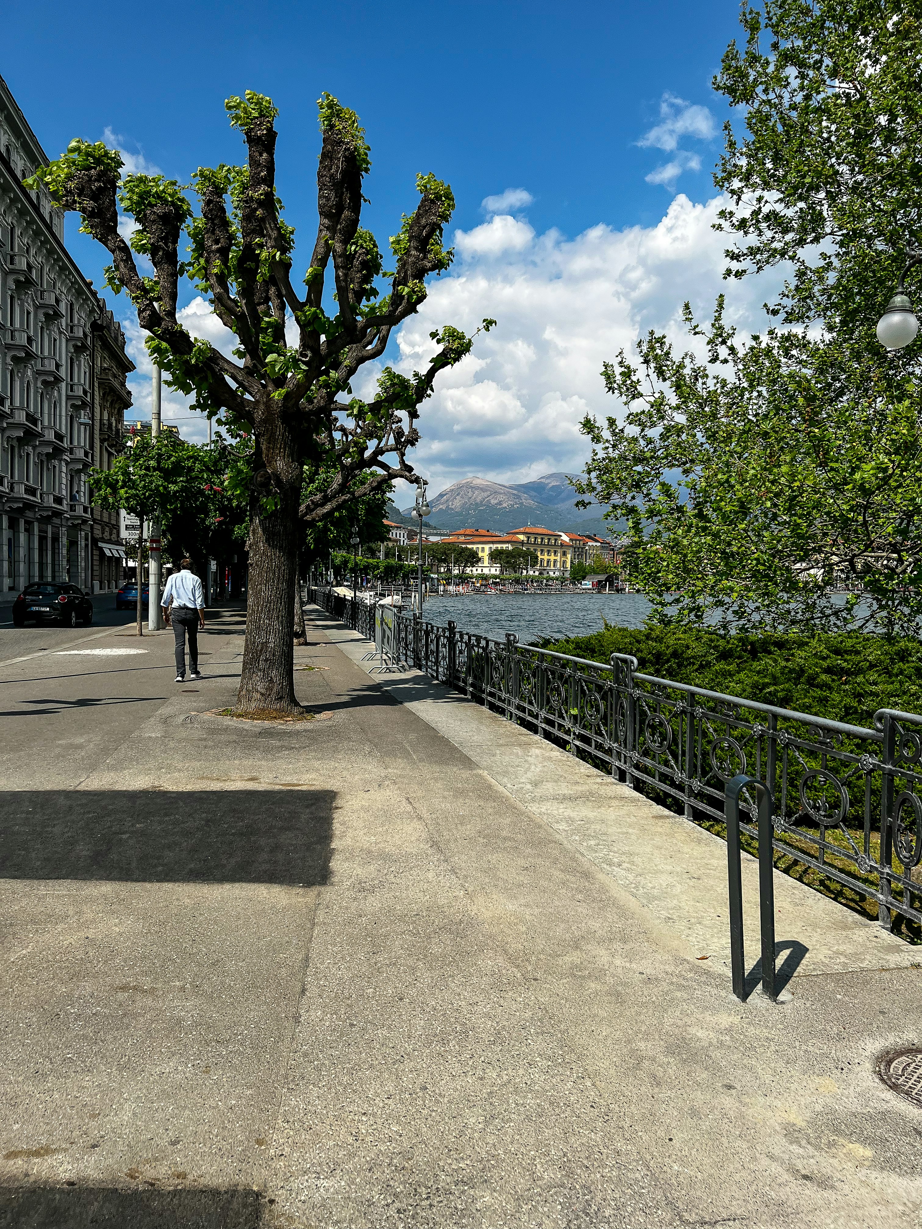 a person walking down a sidewalk