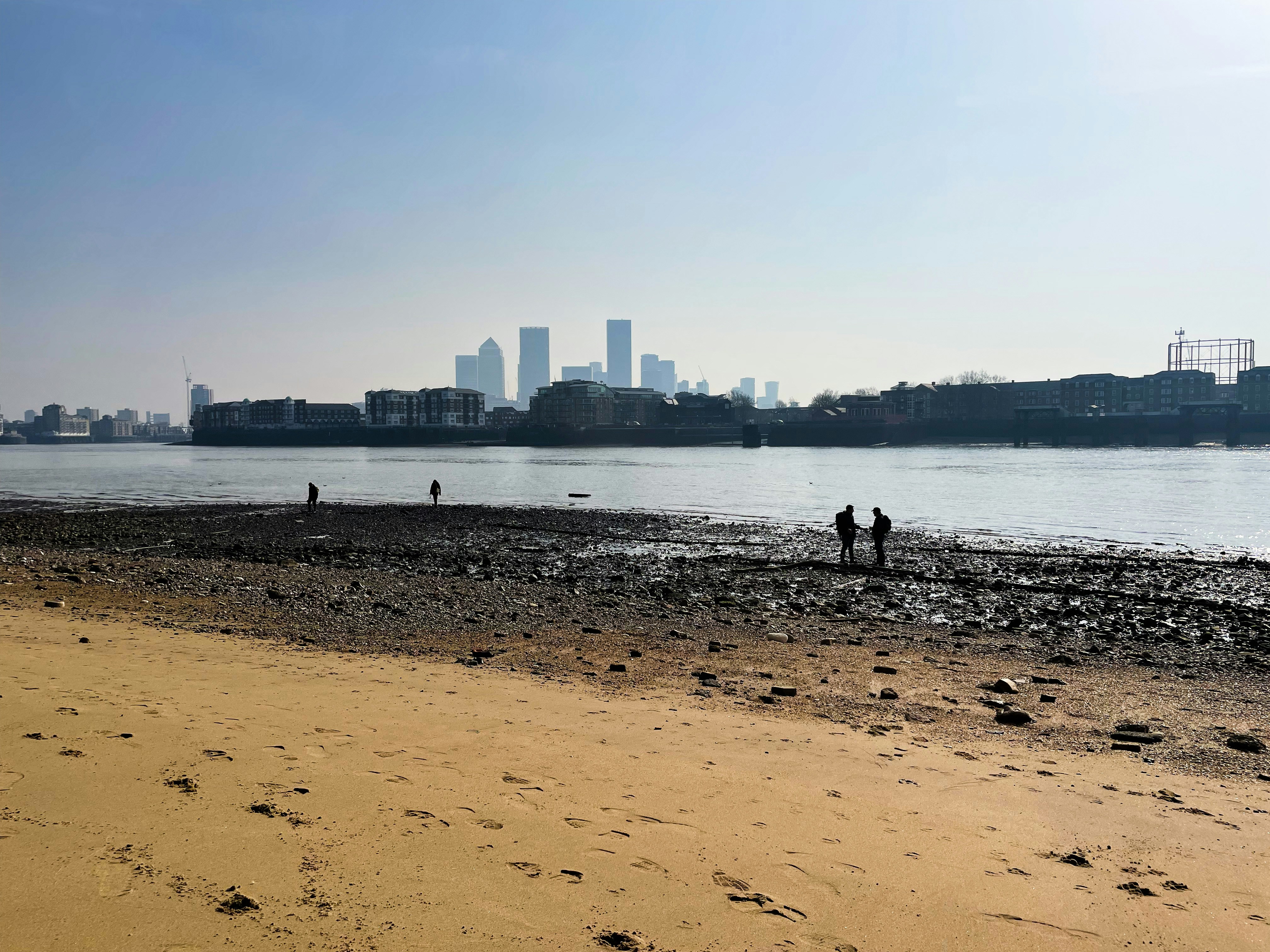 a group of people on a beach