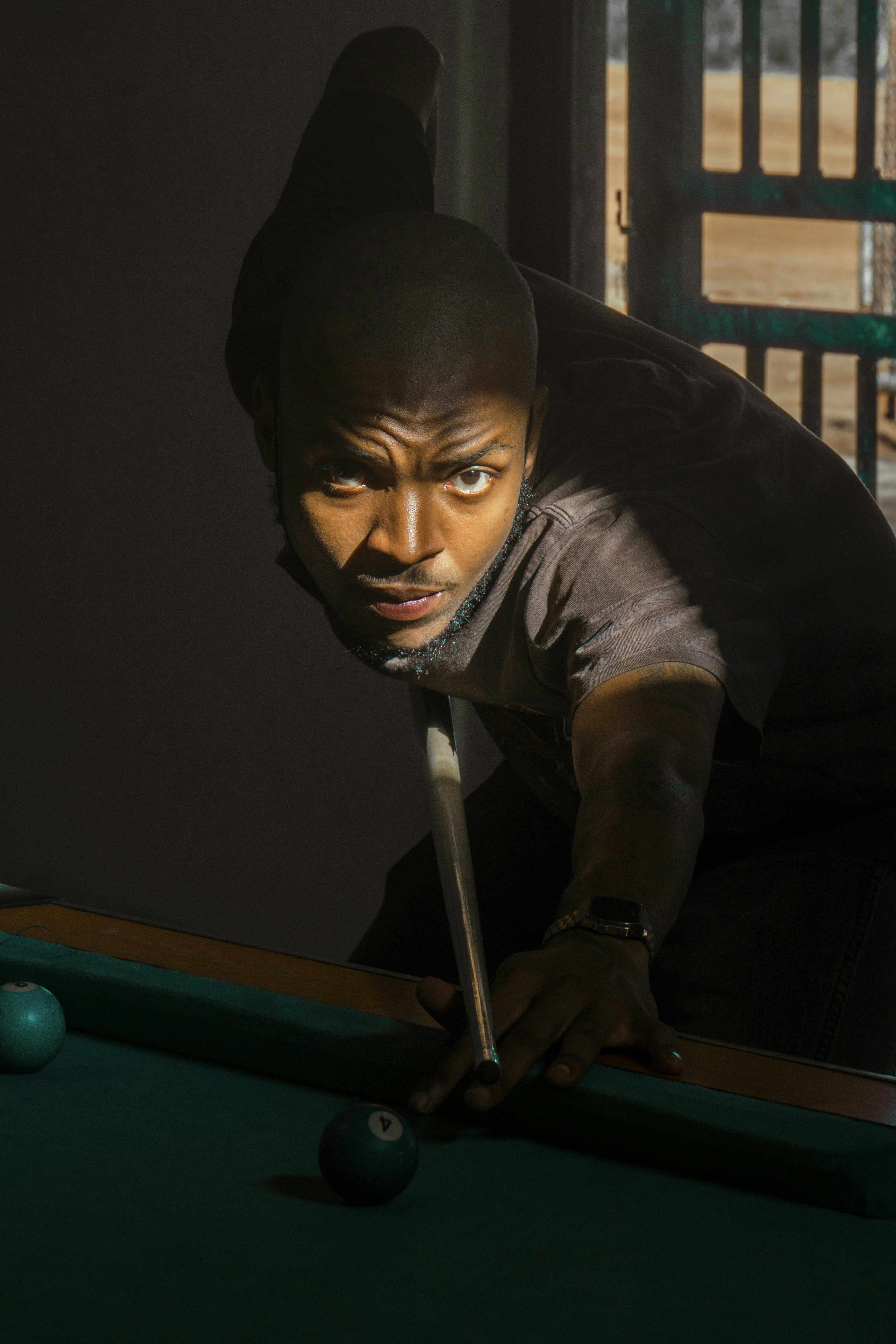 A person playing pool photo – Free Black Image on Unsplash