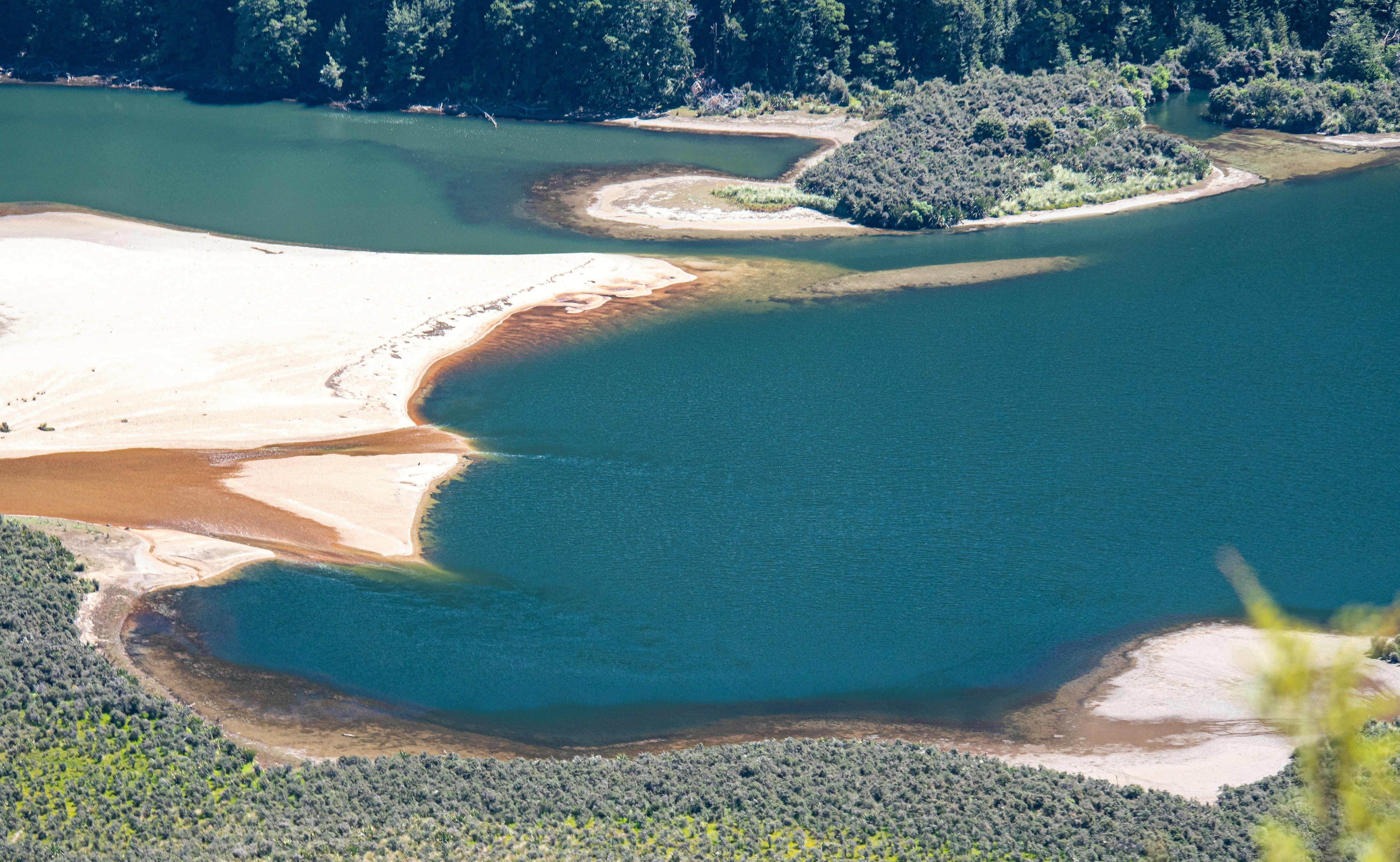 Curved Sandbars Embrace Turquoise Waters