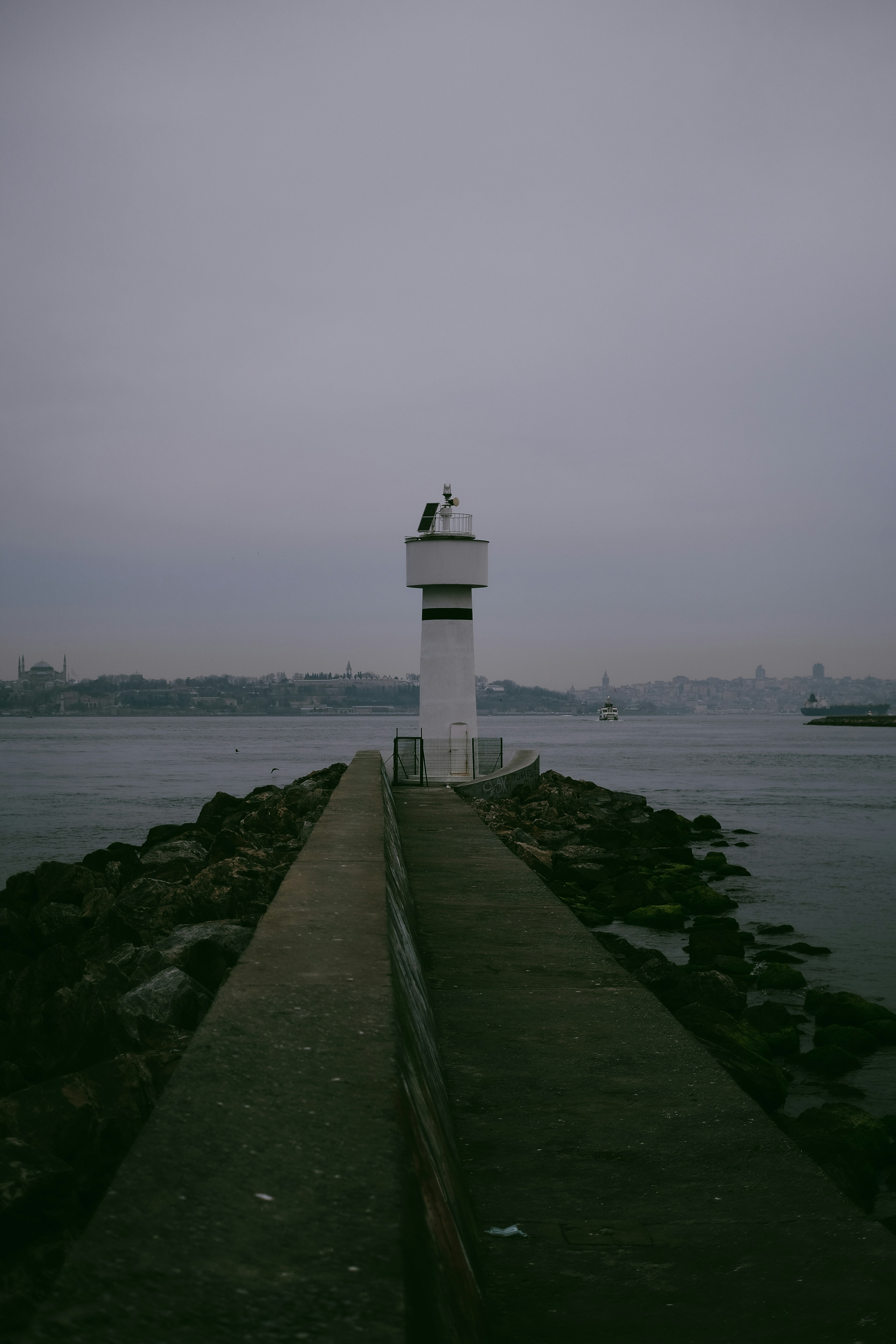 a lighthouse on a pier