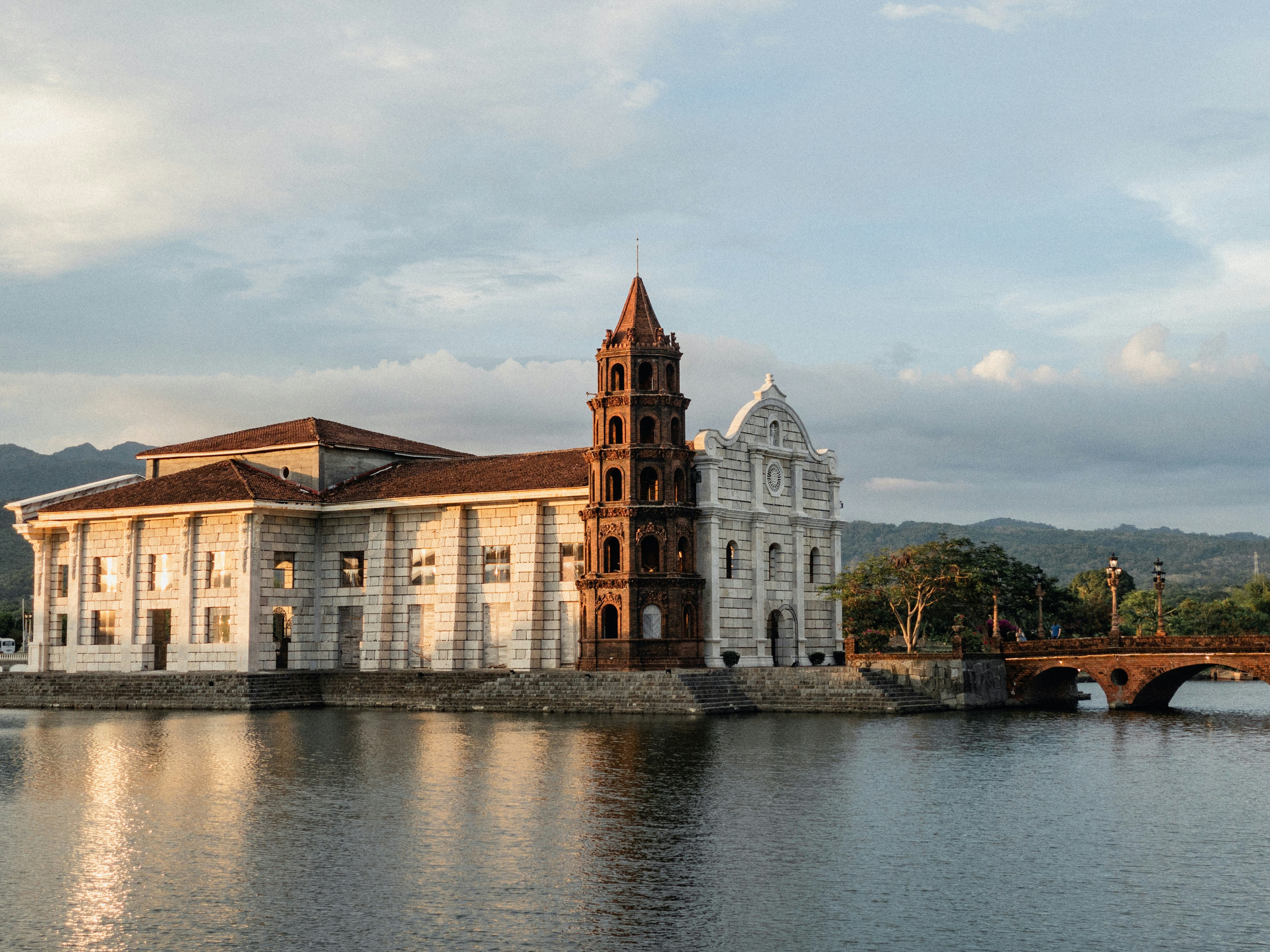 Riverside Cathedral: A Brick Bell Tower Rising by the Water