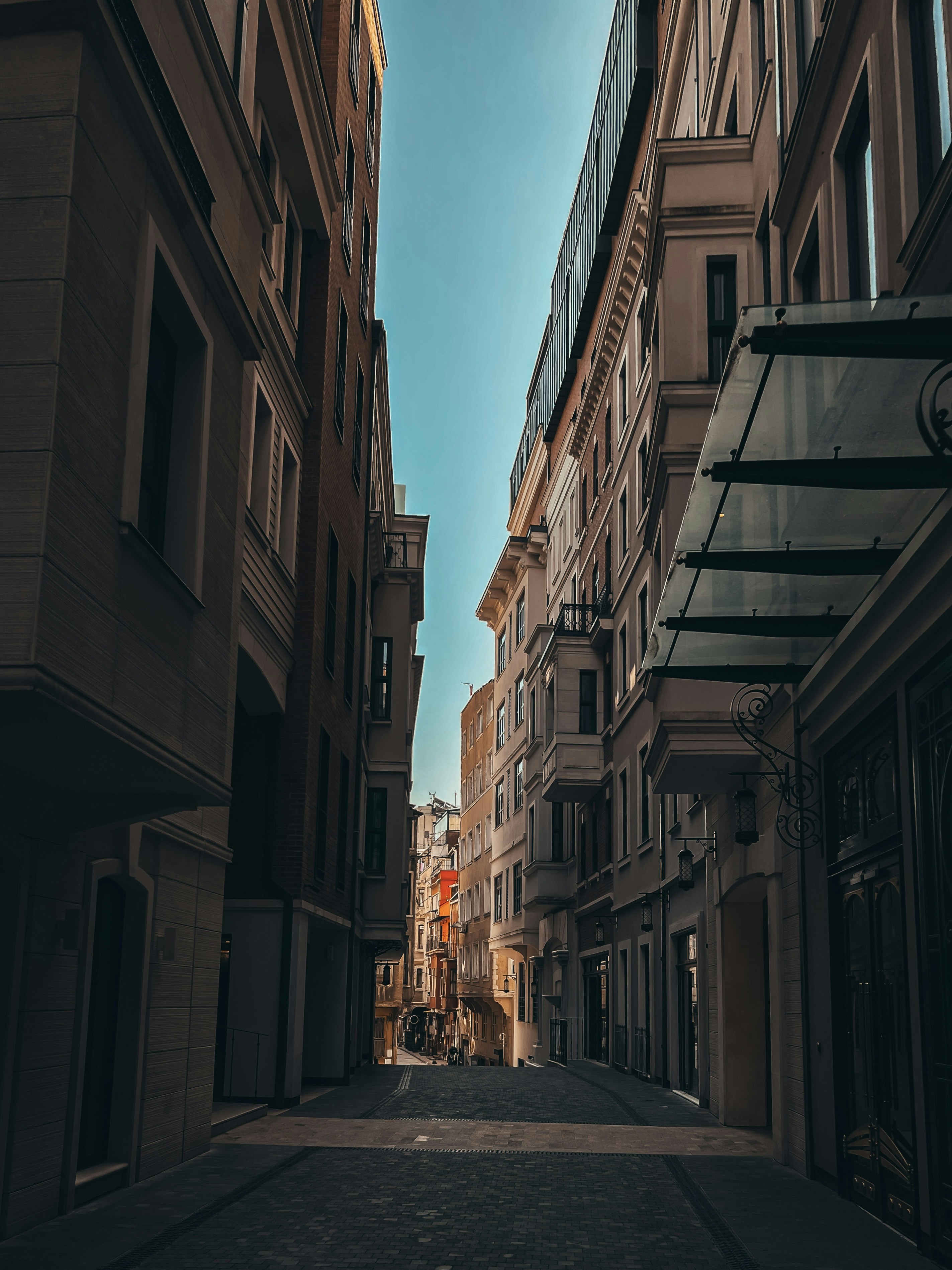 A street between two buildings photo – Free Istanbul Image on Unsplash