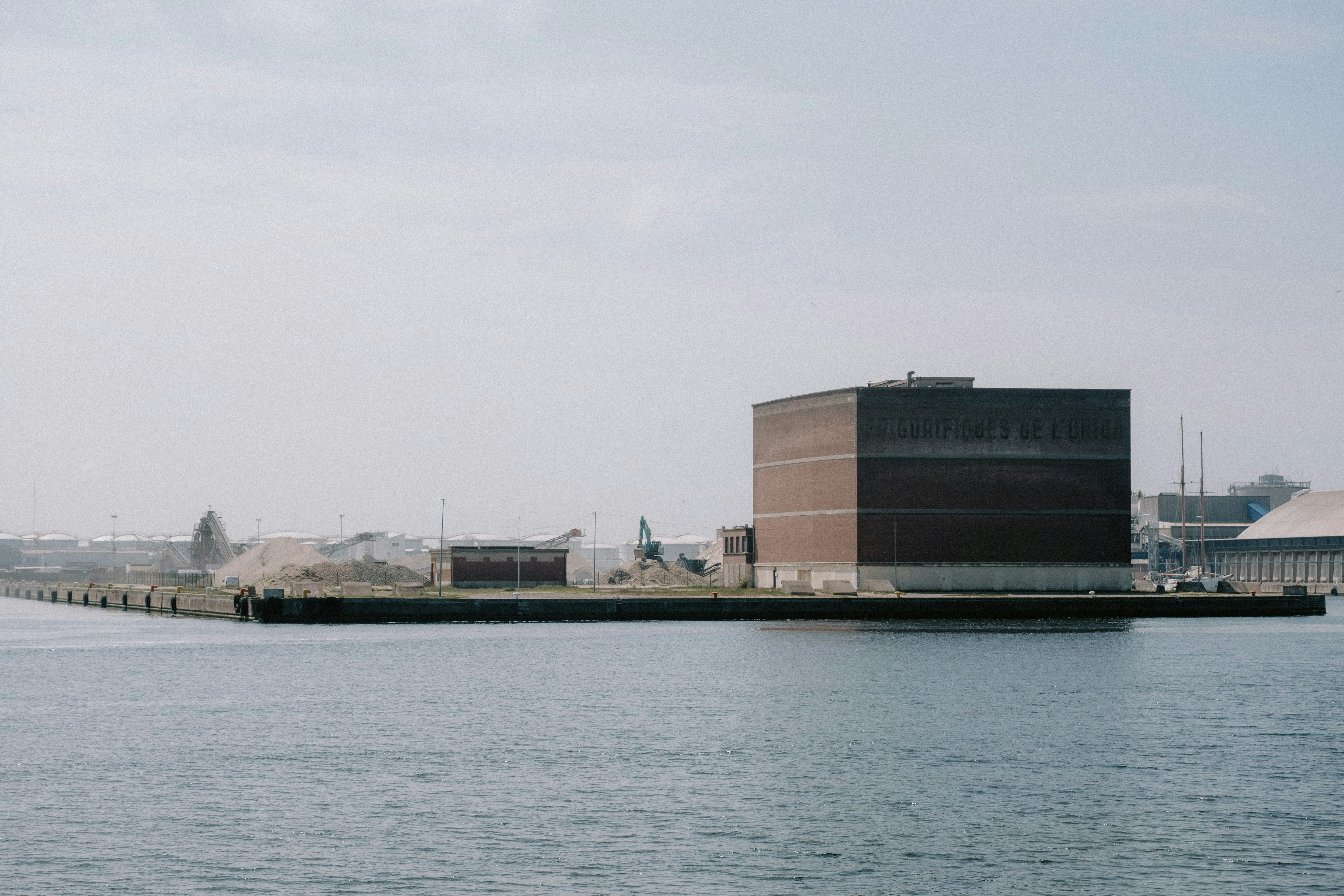 A building on a dock photo – Free Grand port maritime de dunkerque ...