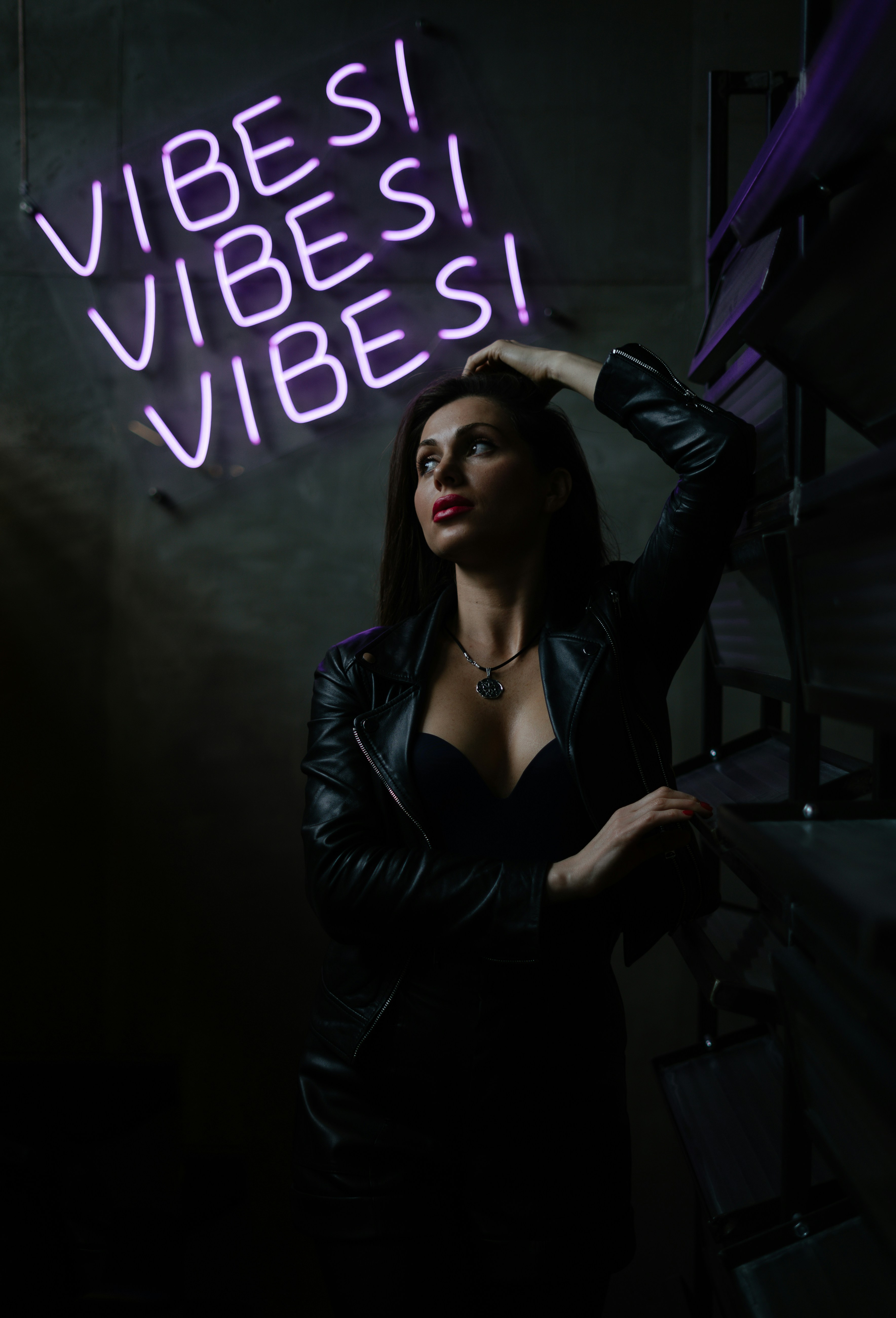 Neon Velvet: A Midnight Portrait under Pink Signage