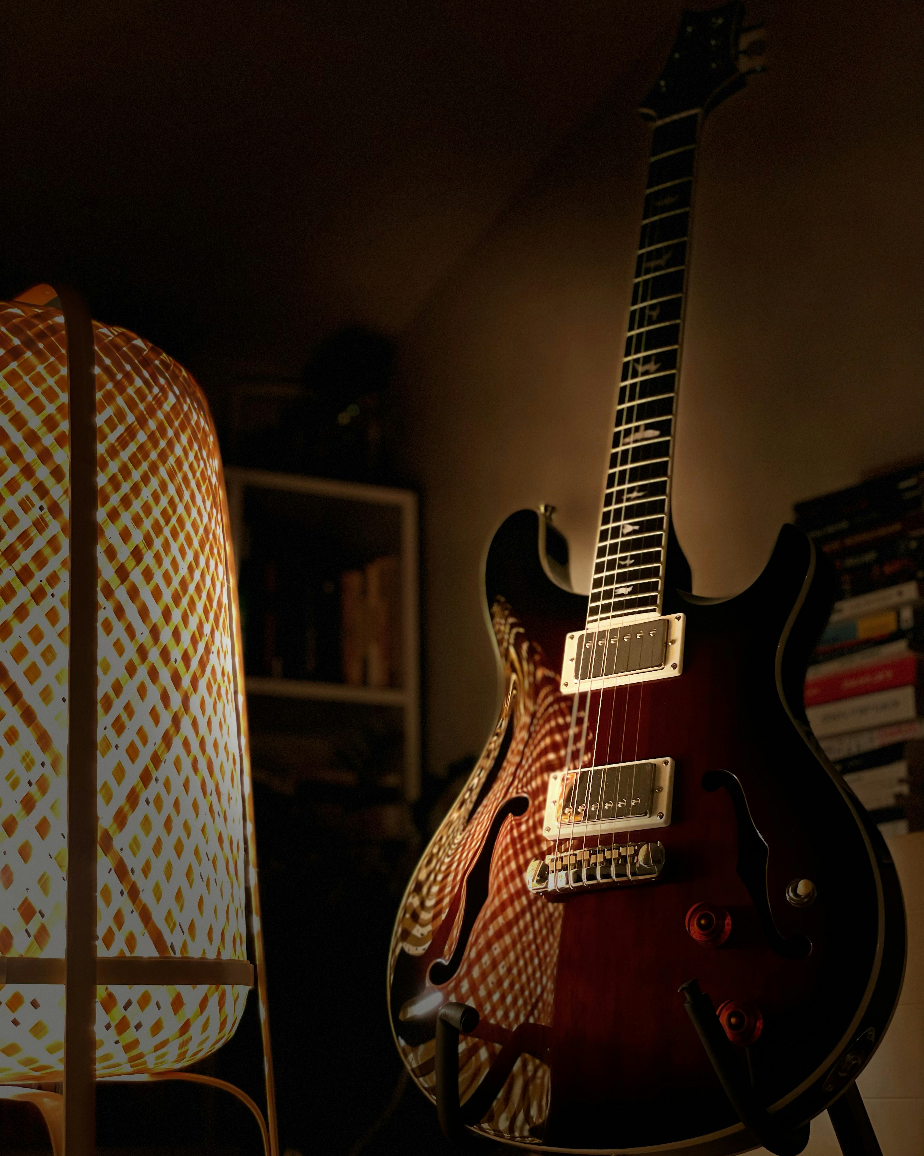 Midnight Rock: A Sunburst Guitar in a Quiet Studio