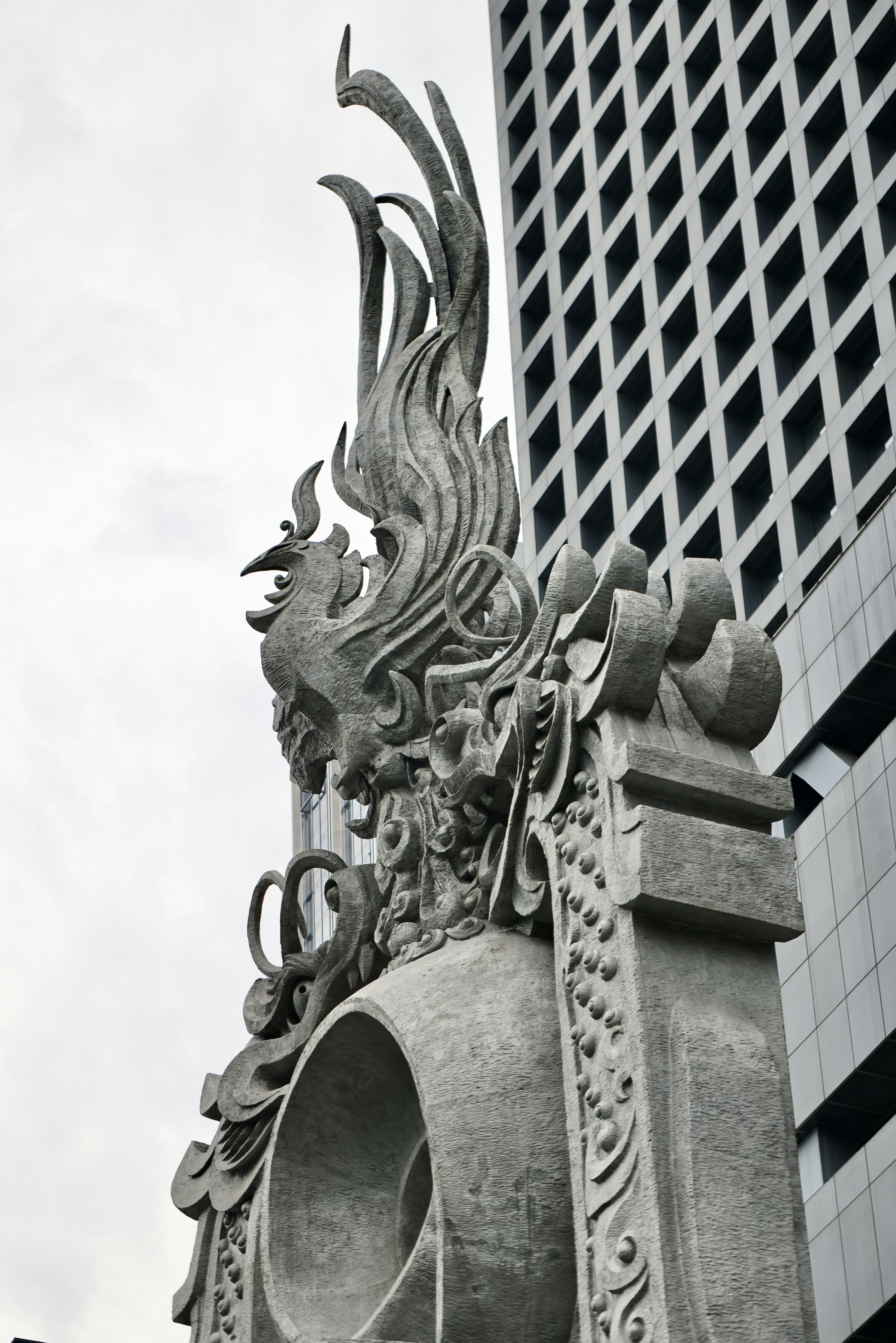 a statue of a person with a sword and shield