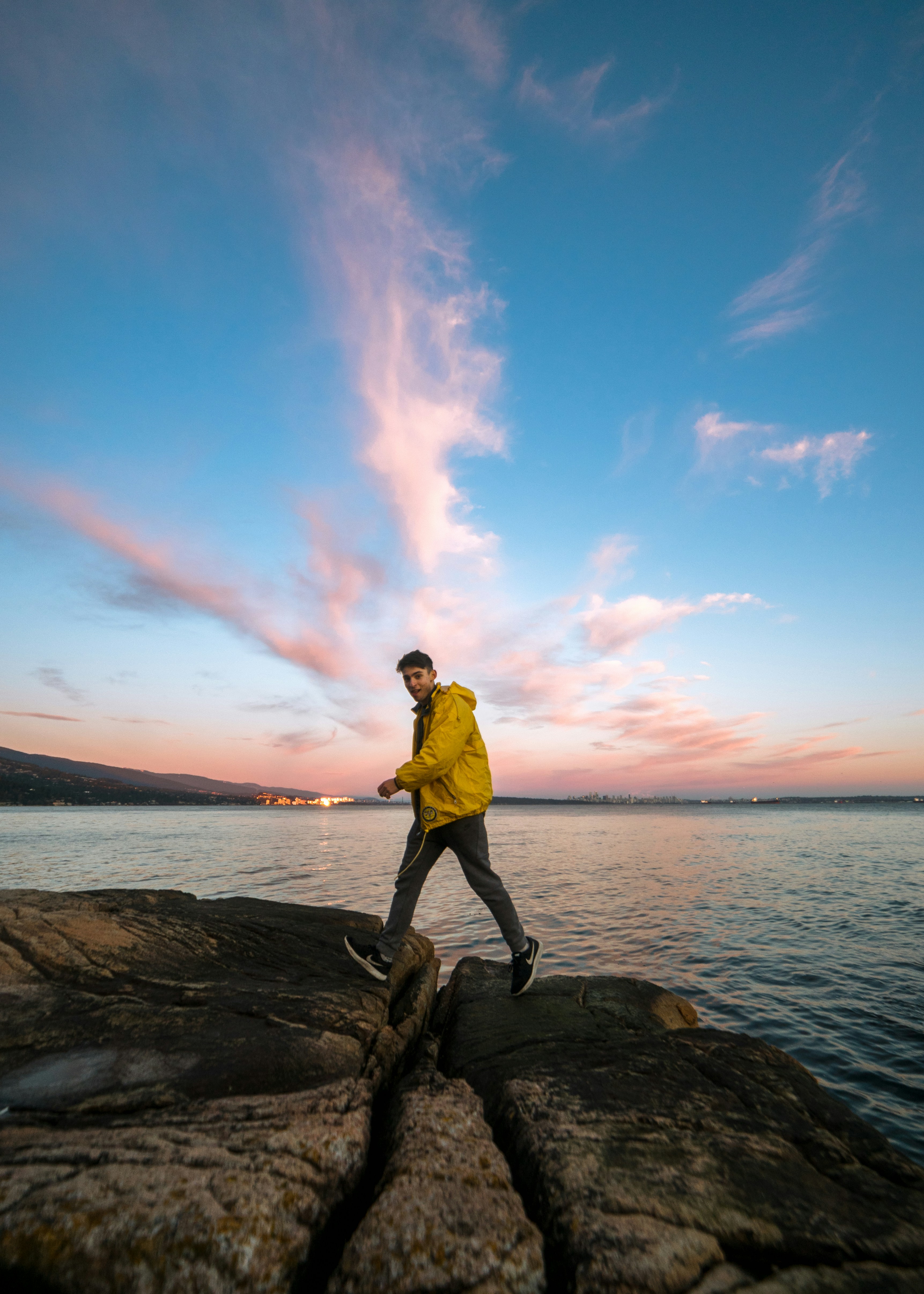 Yellow Jacket on the Break: A Lone Runner Stitches the Sunset