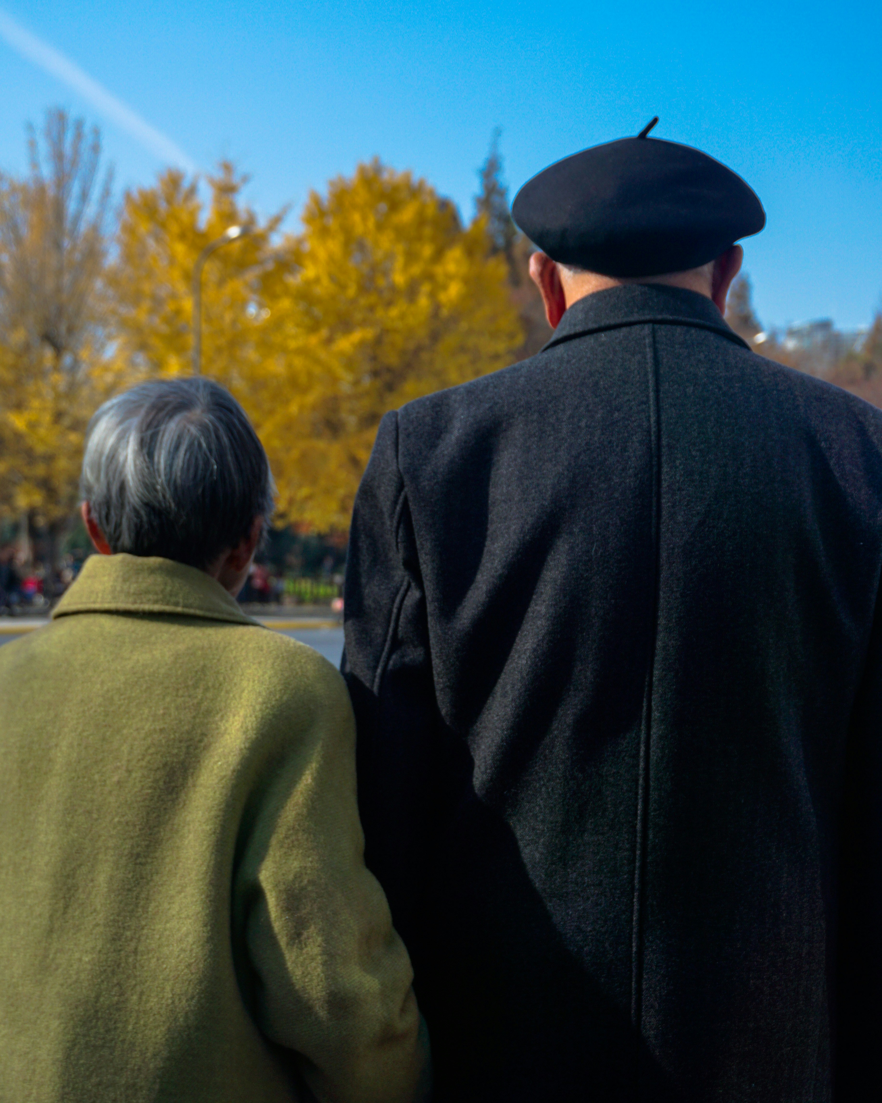 A couple of men wearing black hats photo – Free Shanghai Image on Unsplash