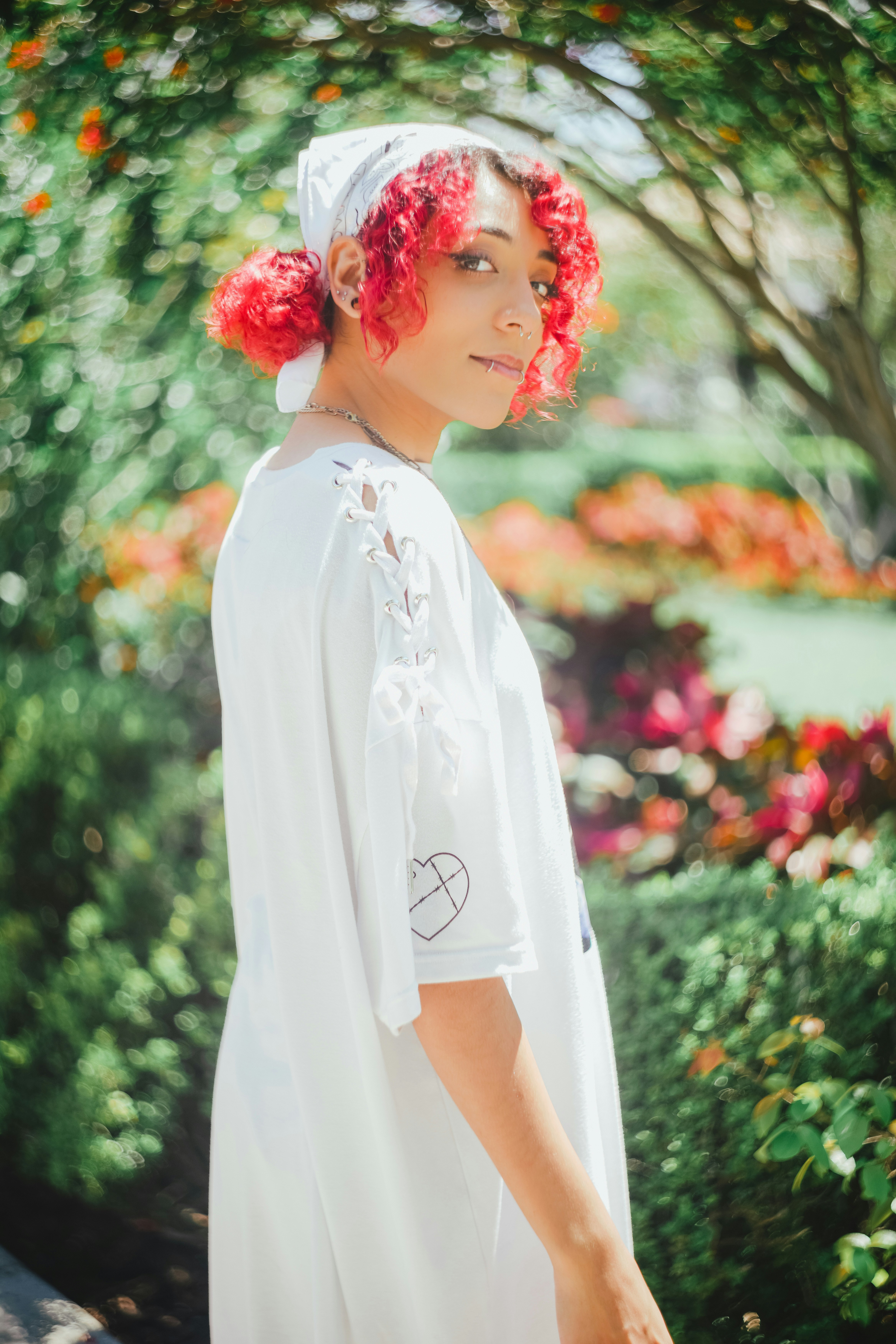Crimson Curls in the Sunlit Garden