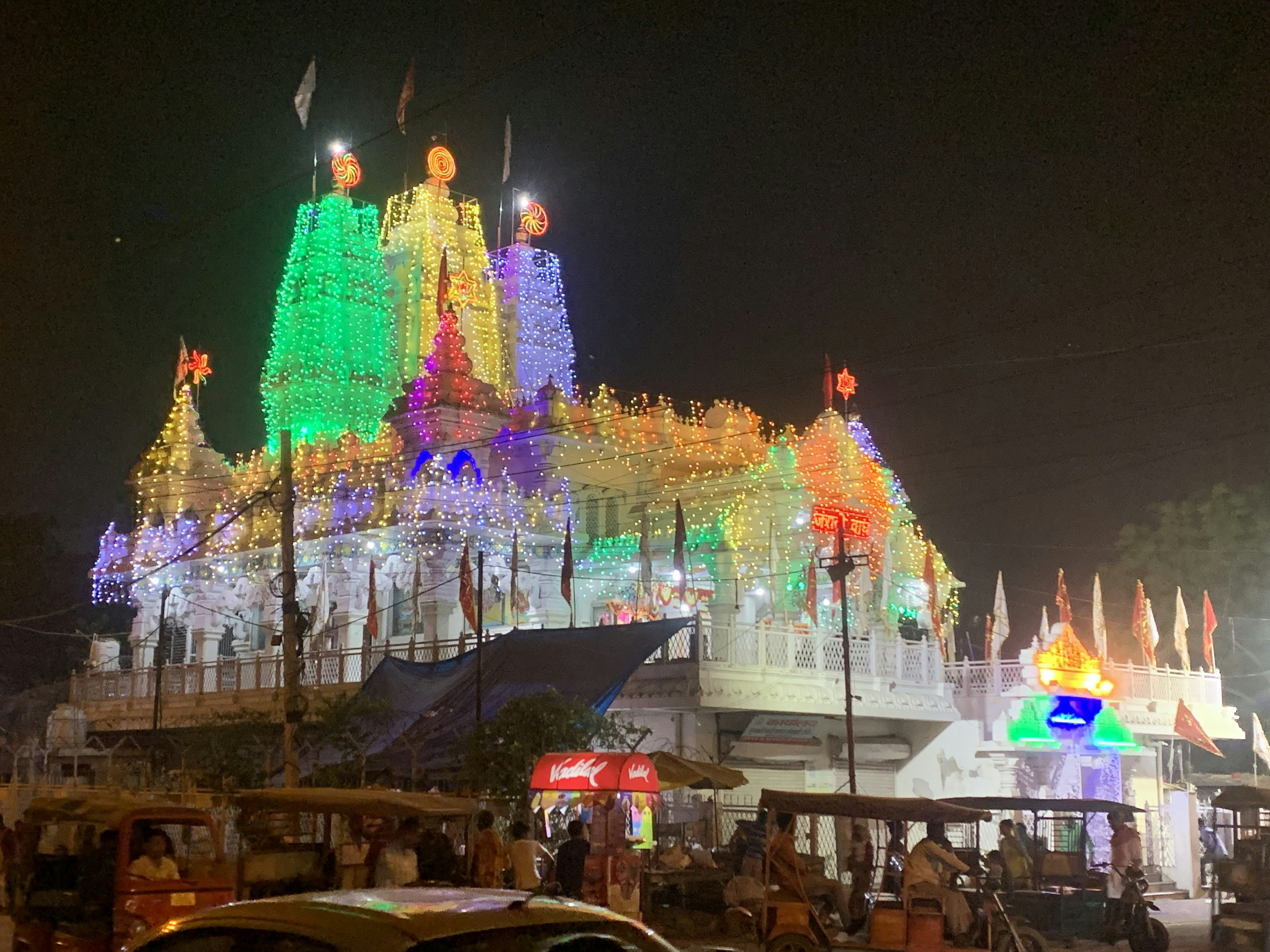 Neon Crowned Temple at a Night Bazaar