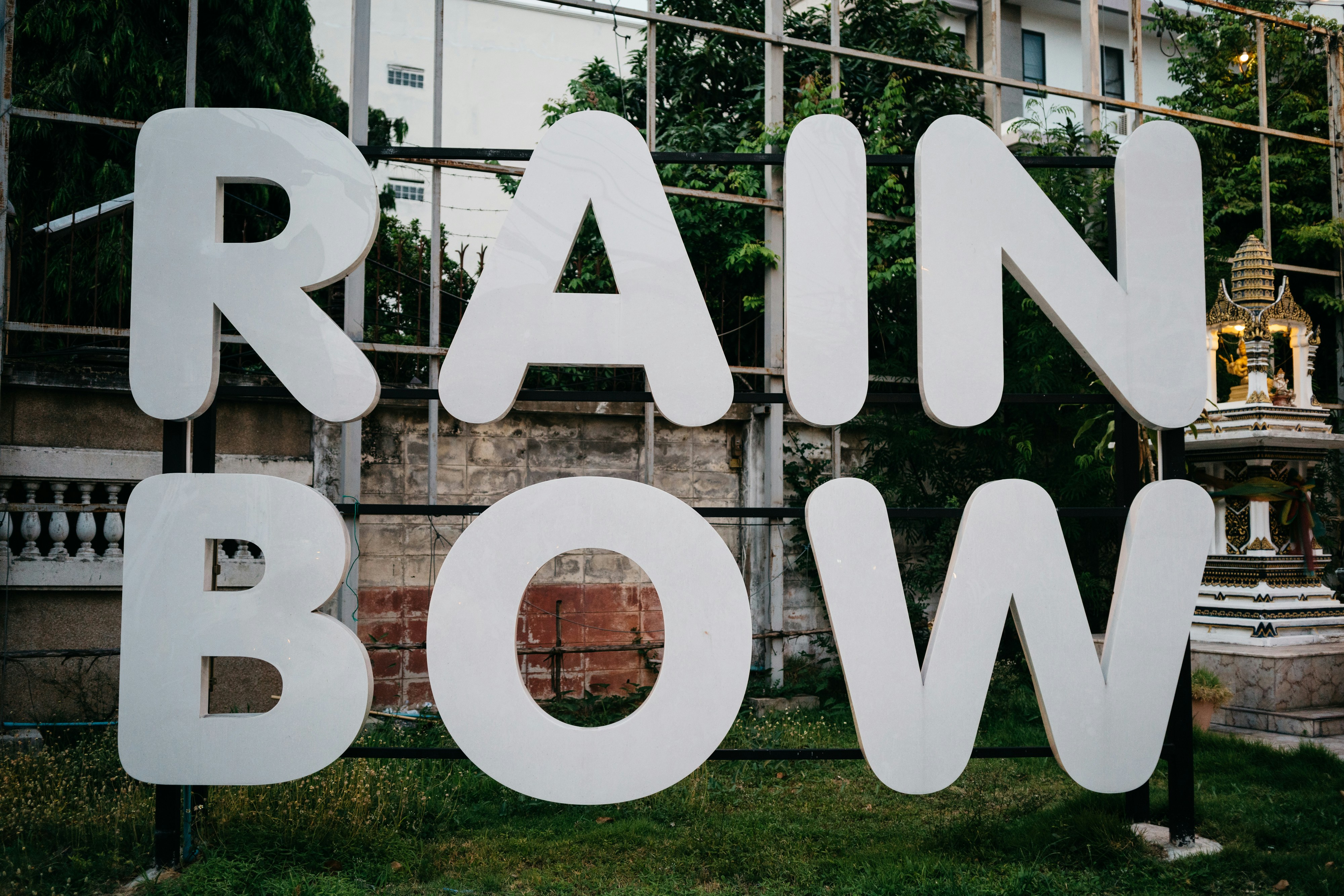A sign with white letters on it photo – Free Bangkok Image on Unsplash